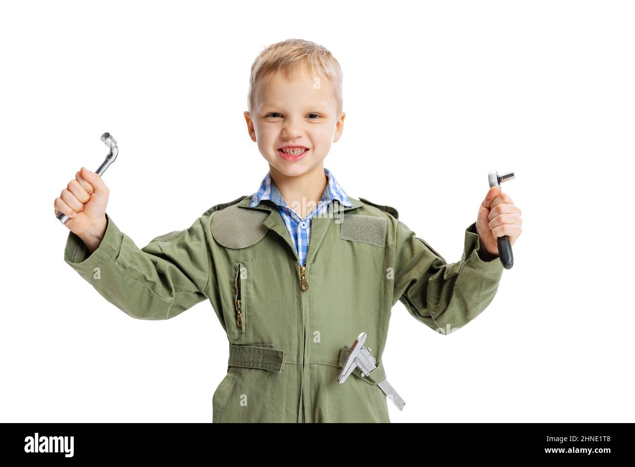 Portrait of little boy, cute kid in image of auto mechanic or fitter in ...