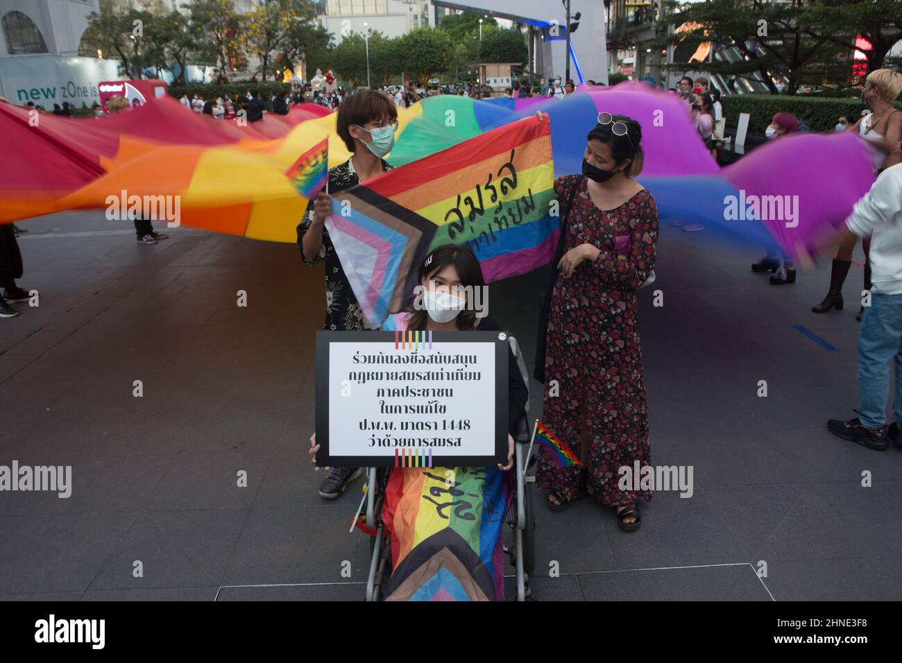 Activist LGBTQ people march with rainbow flags, shout out for equal ...