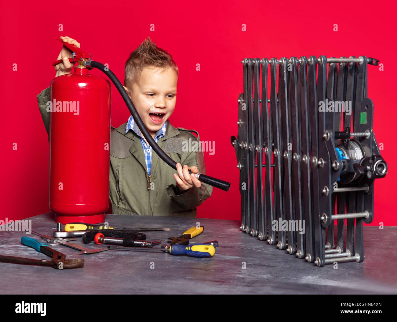 Little worker. Cute preschool boy, child in image of auto mechanic or ...