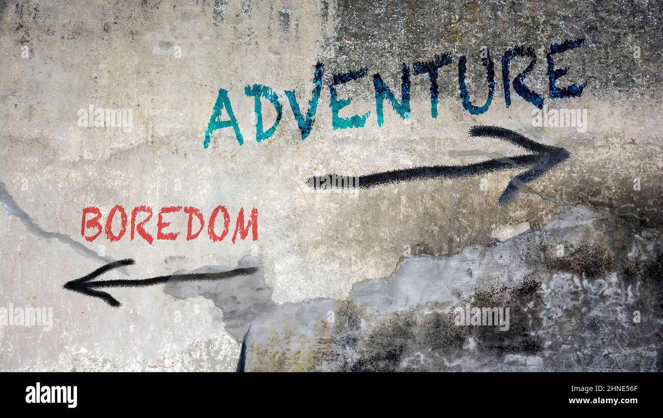 Street Sign the Direction Way to Adventure versus Boredom Stock Photo ...