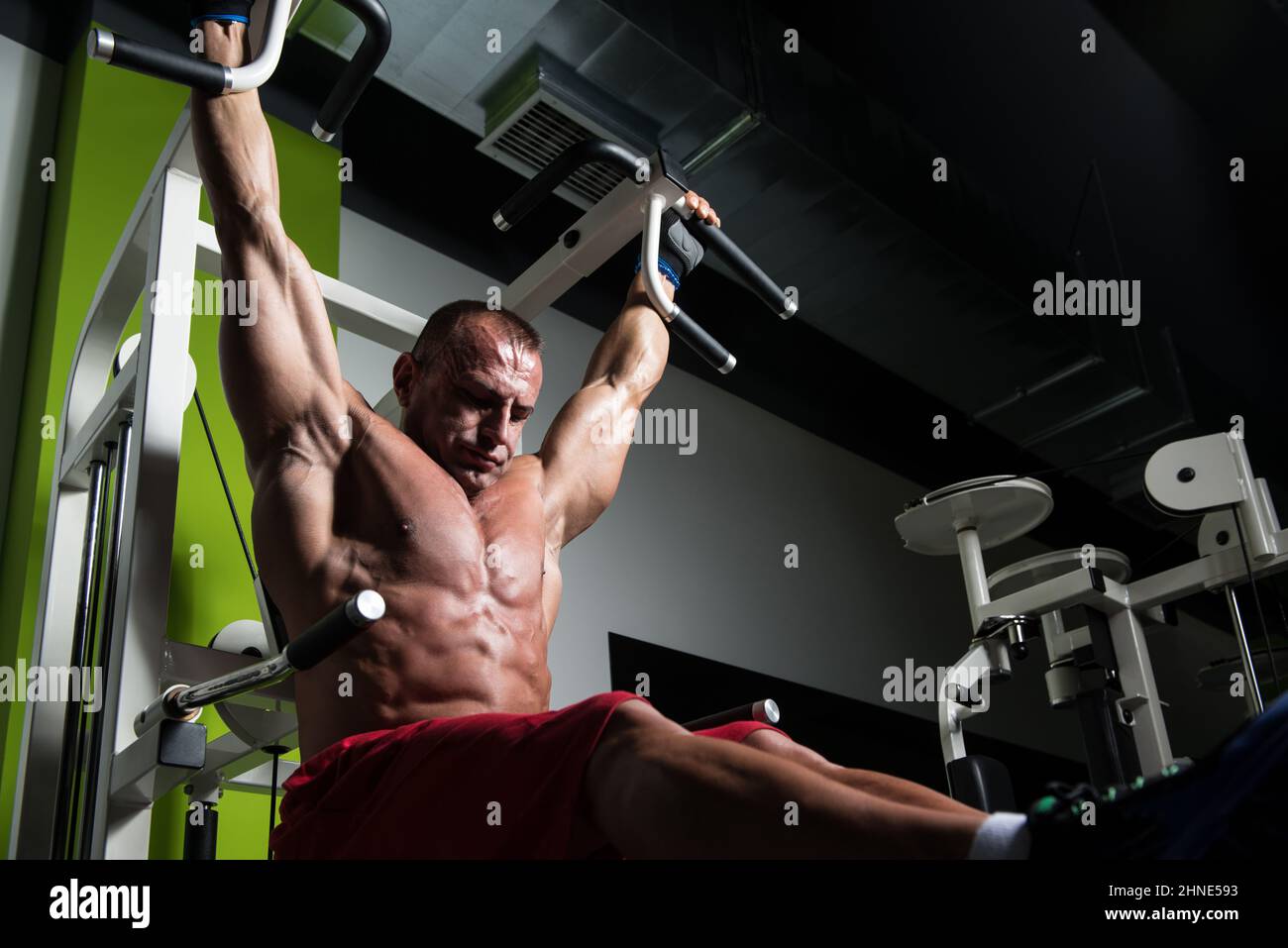Man performing hanging leg hi-res stock photography and images - Alamy