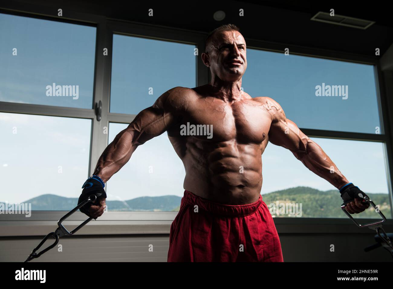 Athlete Is Working Chest Workout Cable Crossover Stock Photo - Alamy