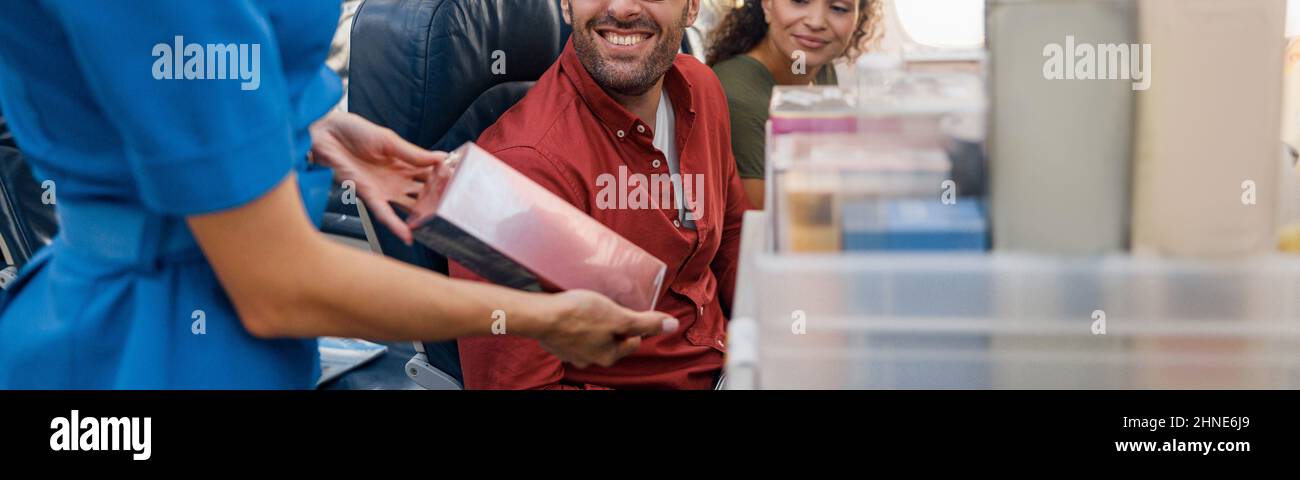 Cabin crew air stewardess trolley hi-res stock photography and images ...