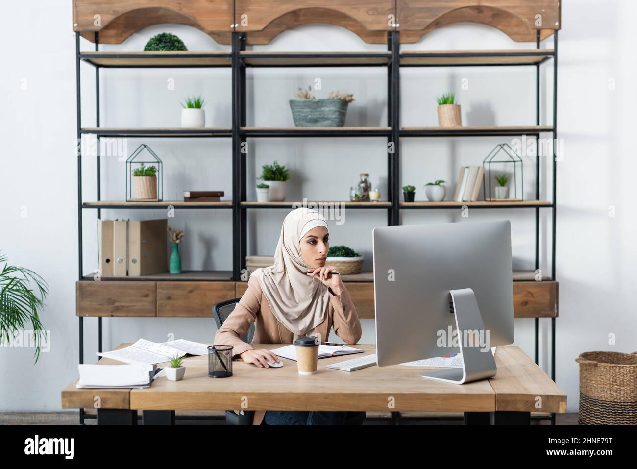 Muslim woman working computer hi-res stock photography and images - Alamy
