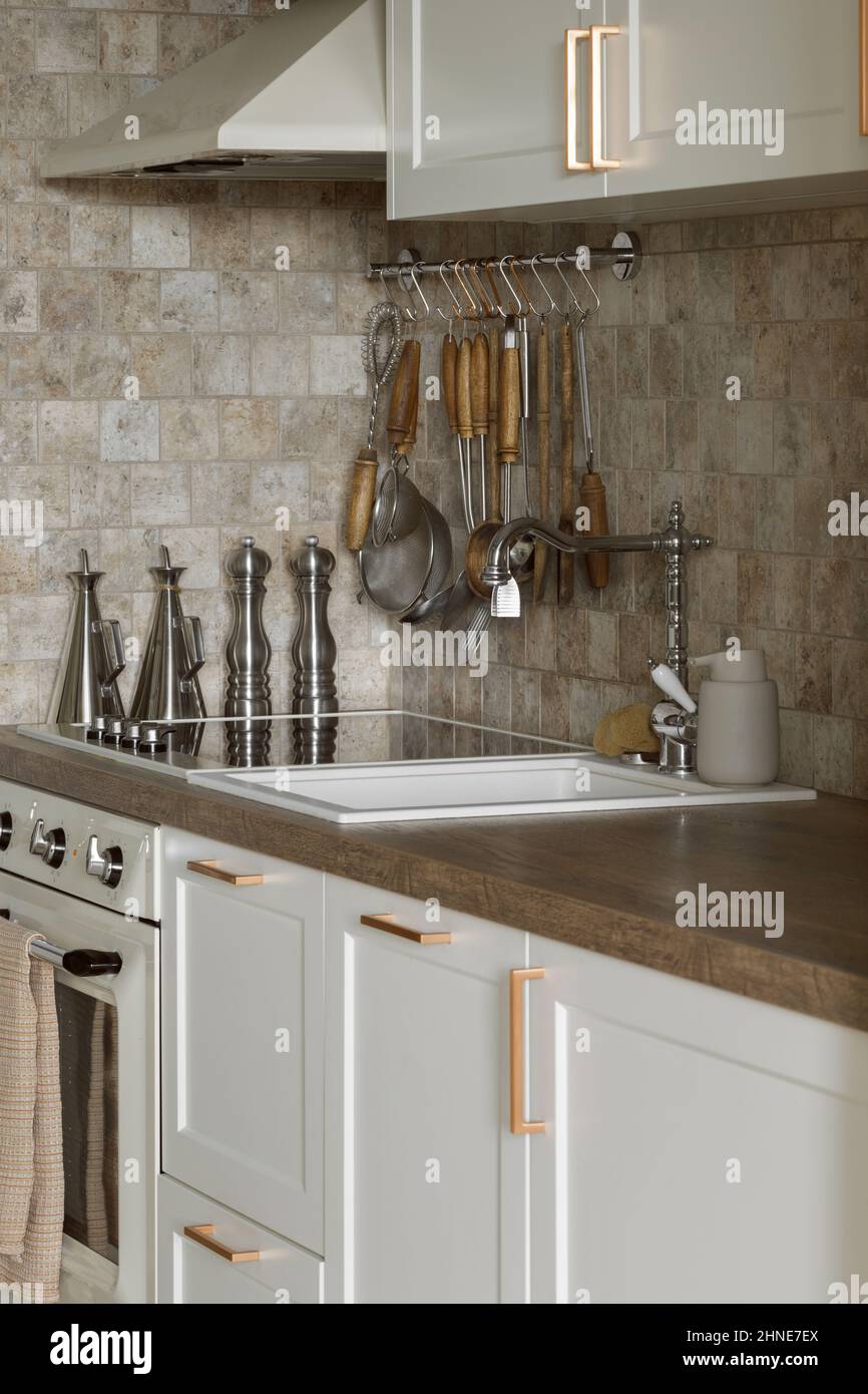 Modern kitchen utensils in contemporary kitchen interior. Comfortable ...