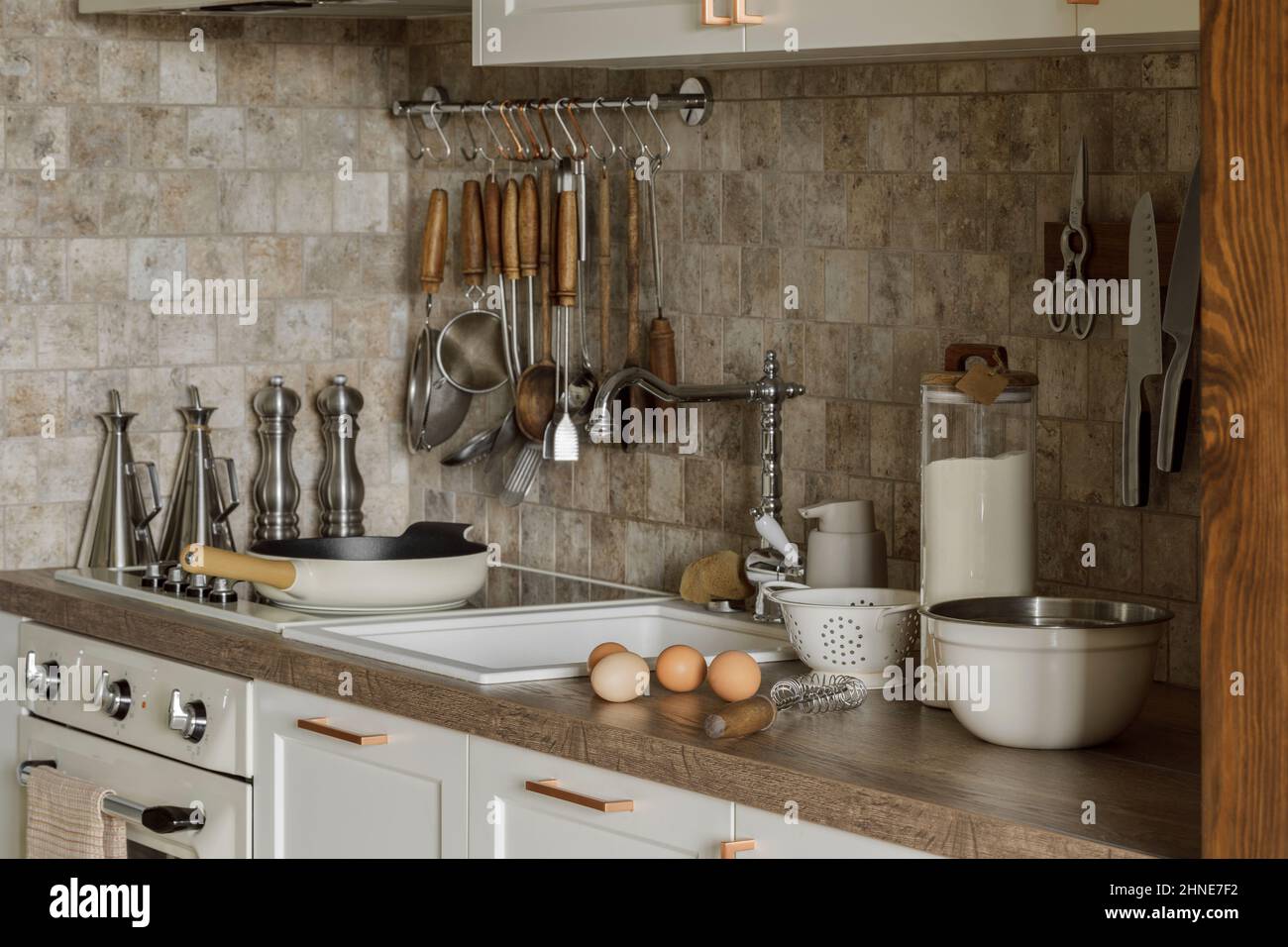 Modern kitchen utensils in contemporary kitchen interior. Comfortable ...