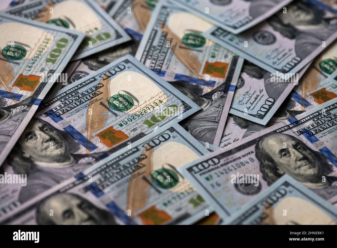 Many banknotes of the United States of America background Stock Photo ...