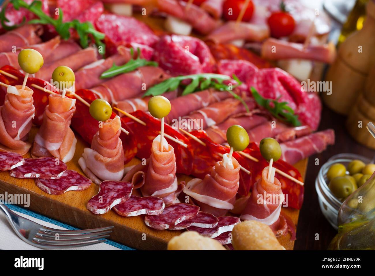 Assortment of sausages fuet, chorizo, jamon Stock Photo - Alamy