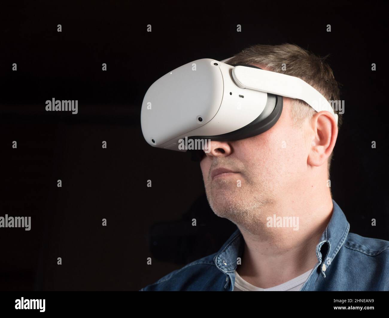 Gamer wearing headset watching hi-res stock photography and images - Alamy
