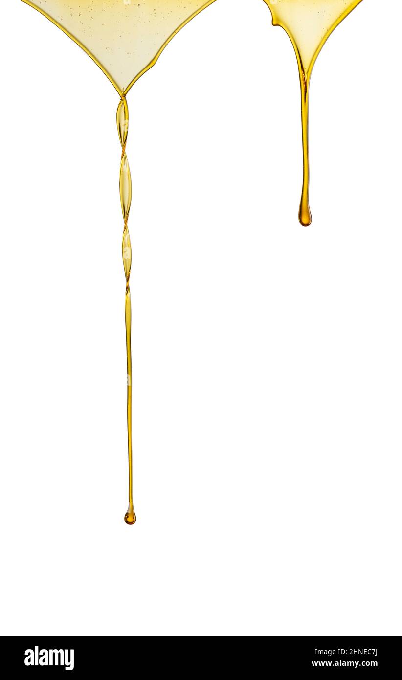 Olive or engine oil dripping on white background Stock Photo - Alamy