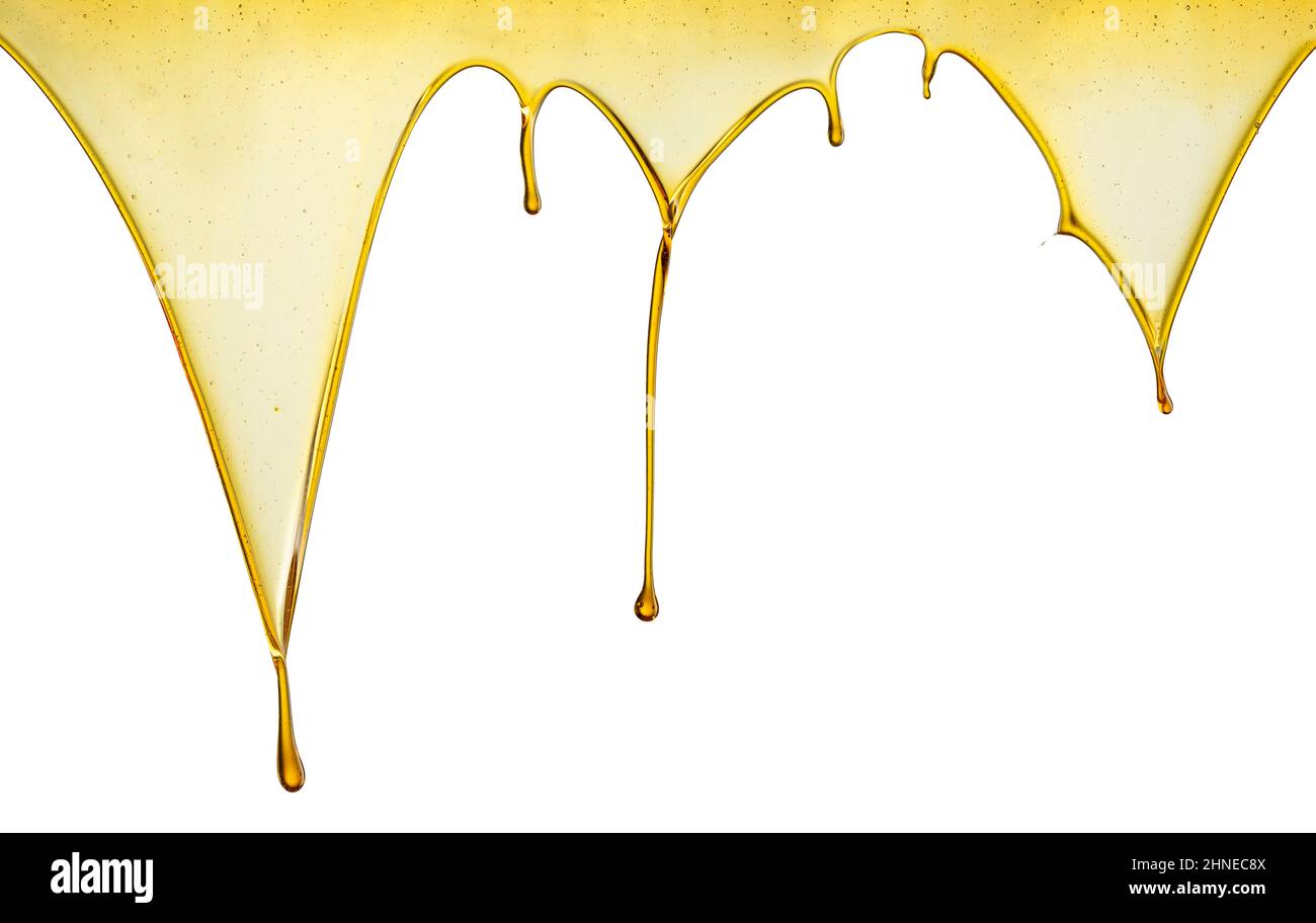 Olive or engine oil dripping on white background Stock Photo - Alamy