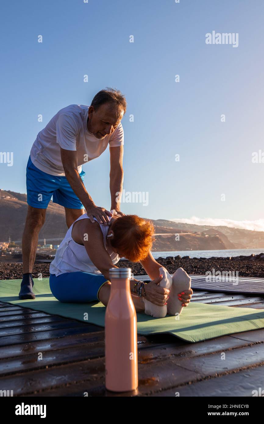 Laughing talking stretching hi-res stock photography and images - Alamy