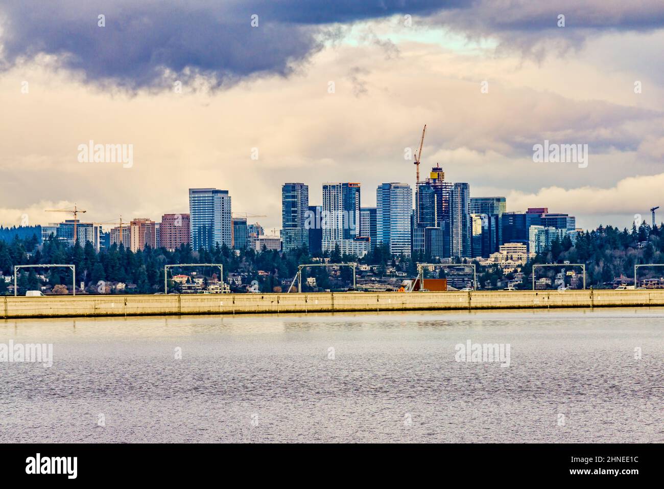 A view of the Bellevue, Washington skyline with a bridge beneath clouds ...