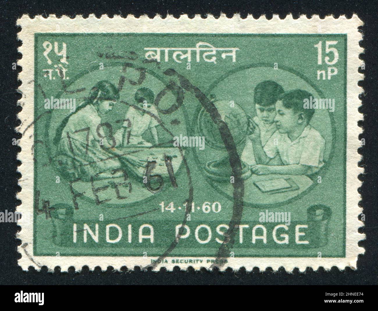 INDIA - CIRCA 1960: stamp printed by India, shows children, globe and ... INDIA - CIRCA 1960: stamp printed by India, shows children, globe and ...