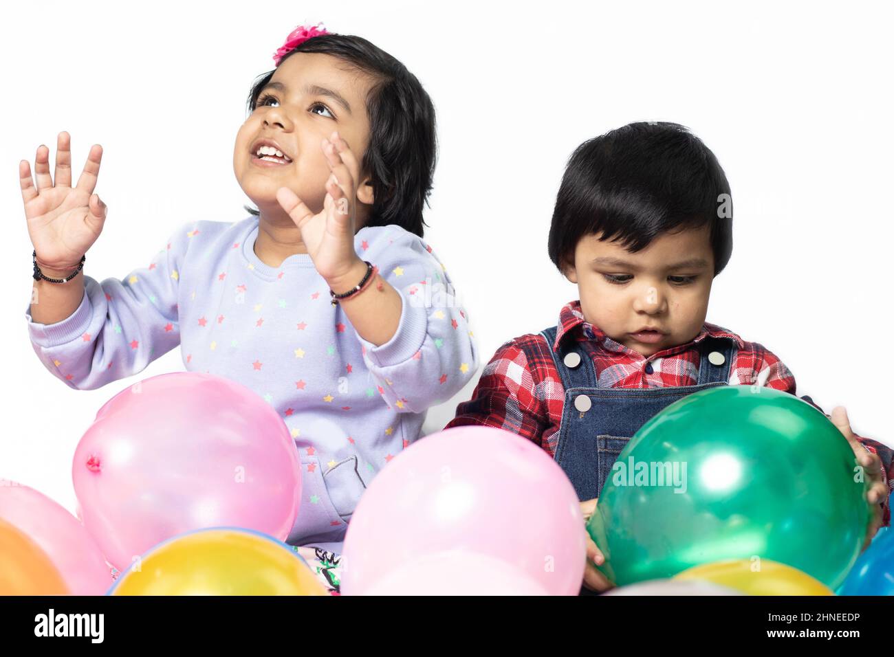 Asian Indian Girl And Boy Playing With Balloons. Fun, Activity ...