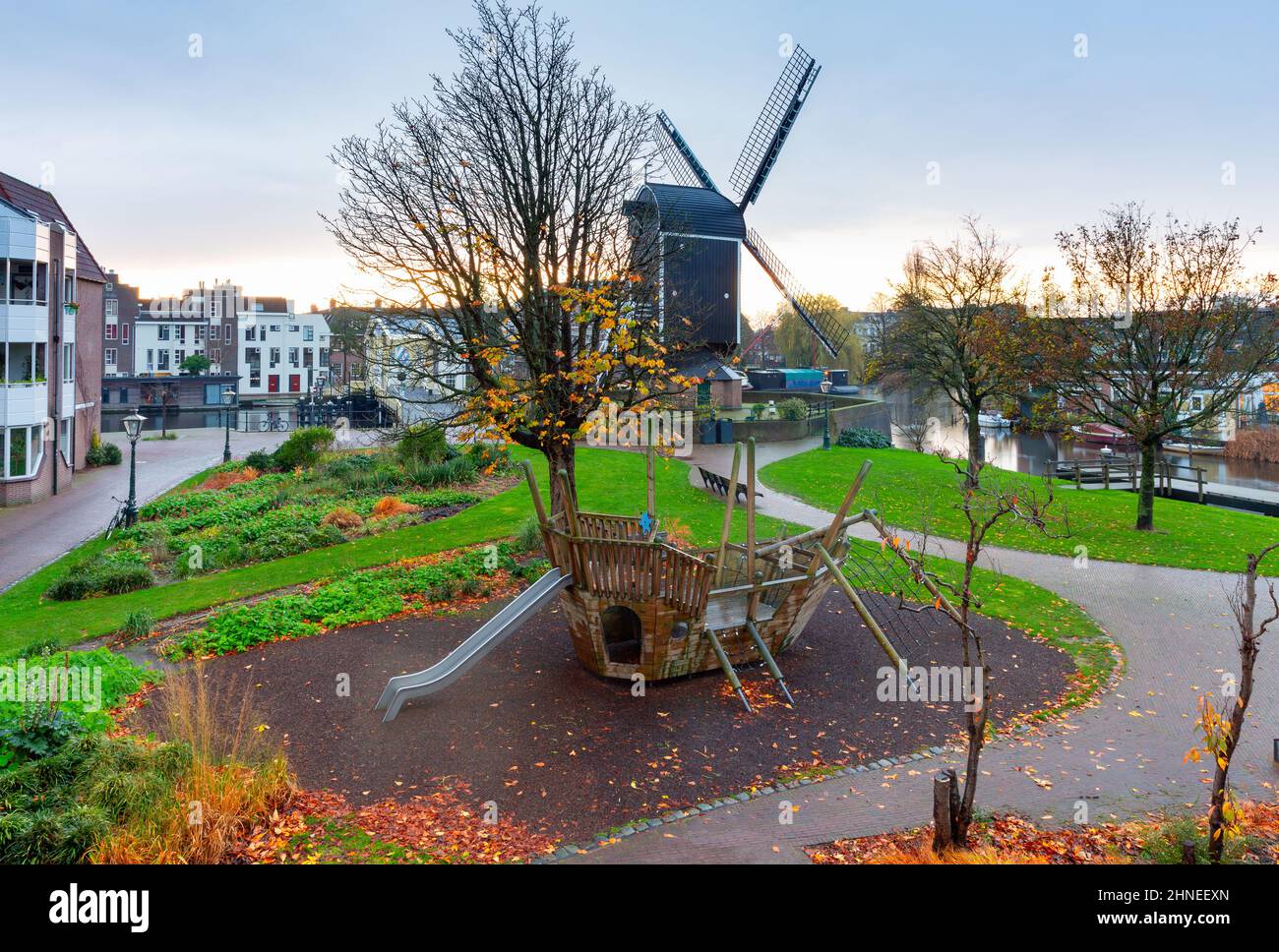 Old wooden traditional Dutch windmill in the early morning. Leiden ...
