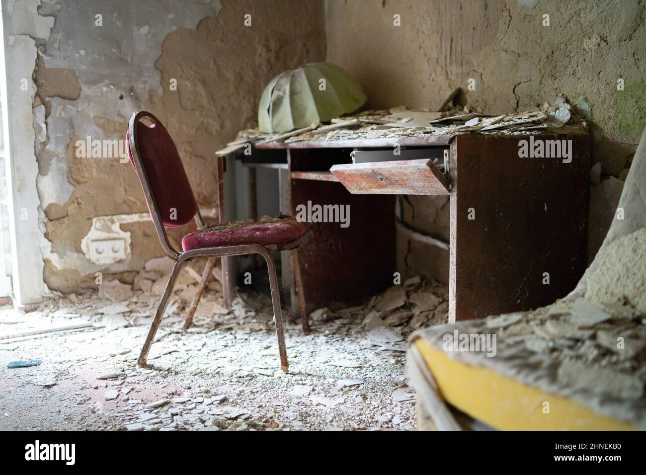 Dusty and destroyed desk for Kids in an abandoned sanatorium, Germany ...
