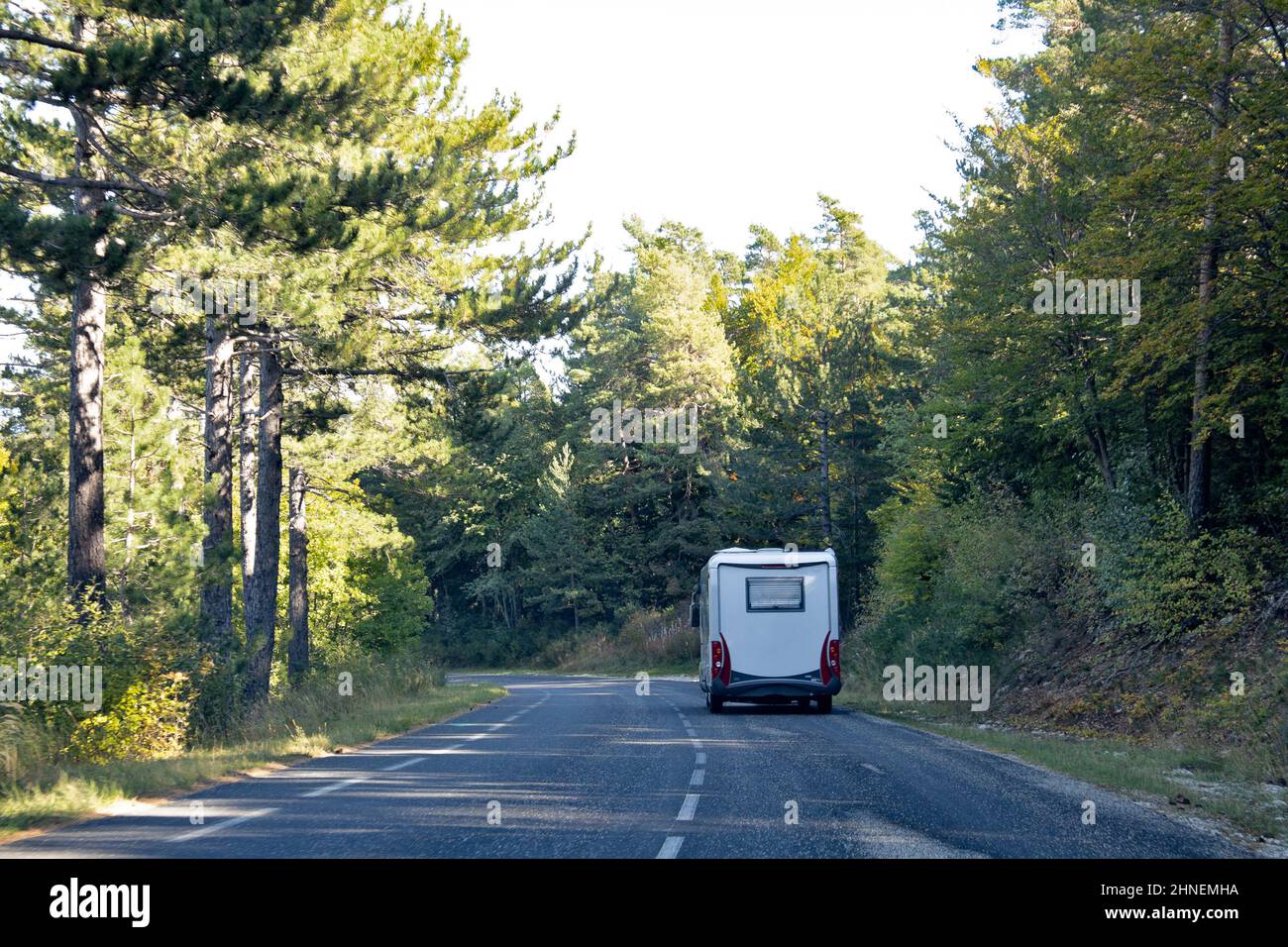 rolling motorhome seen from behind Stock Photo - Alamy
