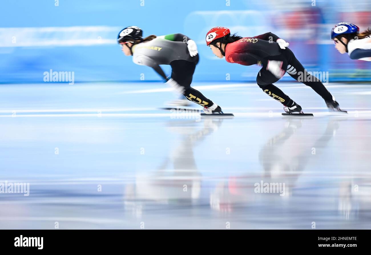Beijing, China. 16th Feb, 2022. Zhang Yuting (C) of China competes ...