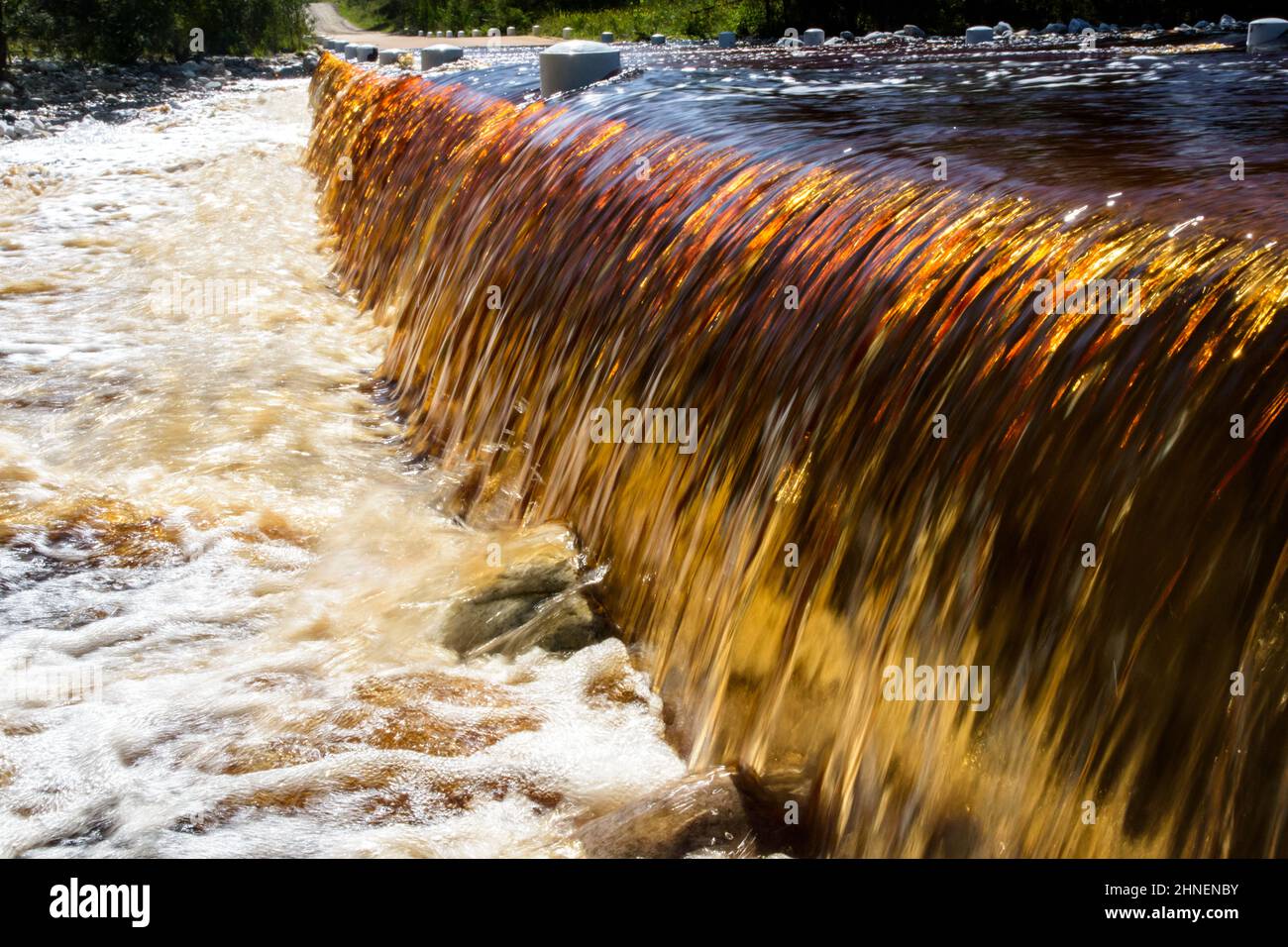 Water over weir in Western Cape river, South Africa Stock Photo - Alamy