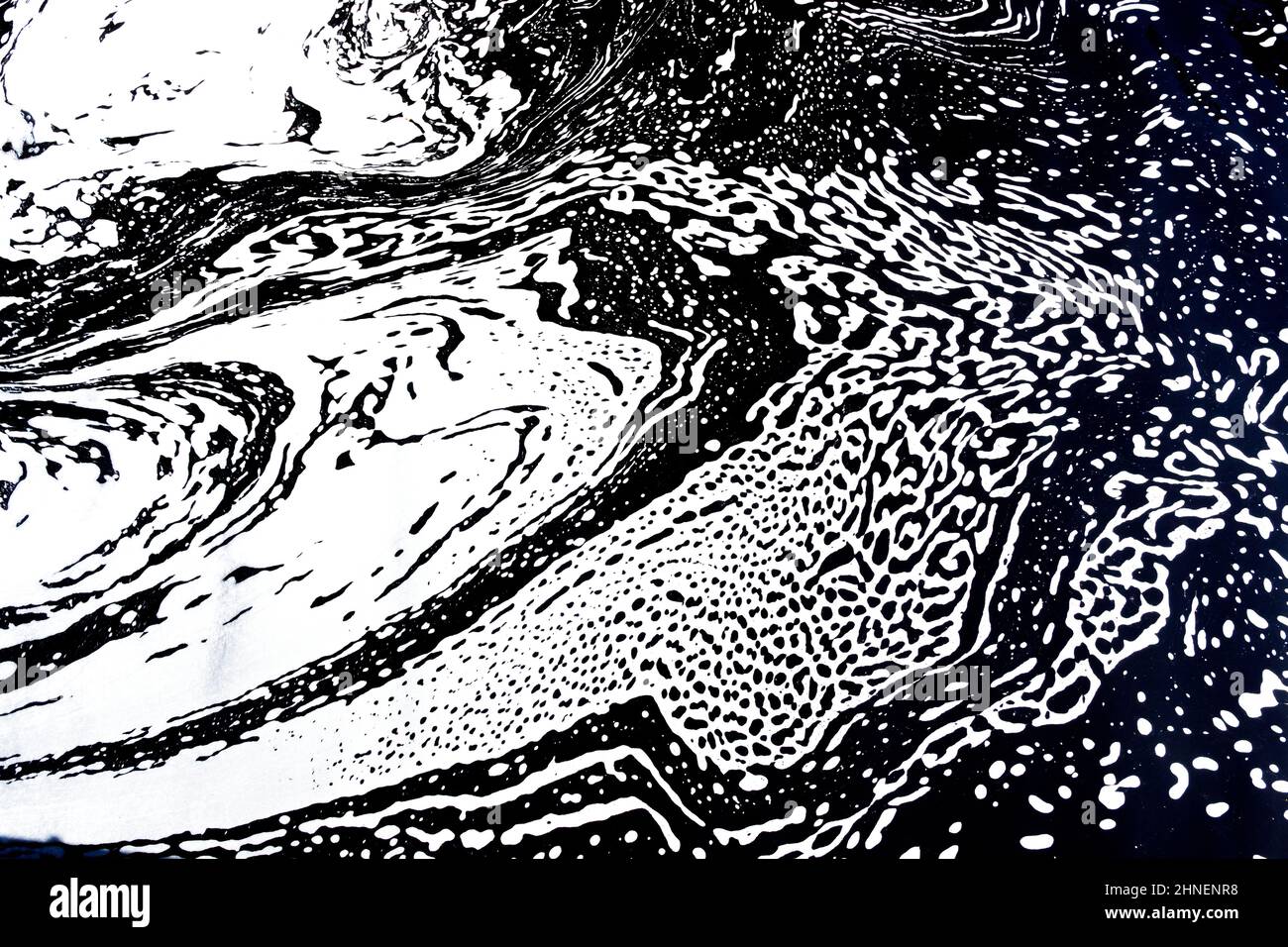 Foam patterns on water Stock Photo - Alamy