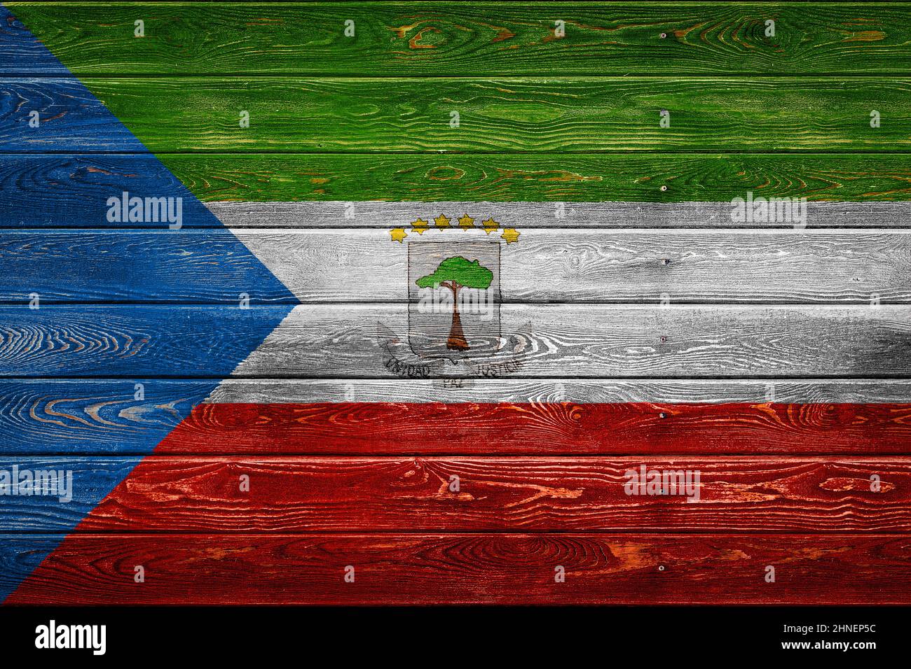 The national flag of Equatorial Guinea is painted on a camp of even ...