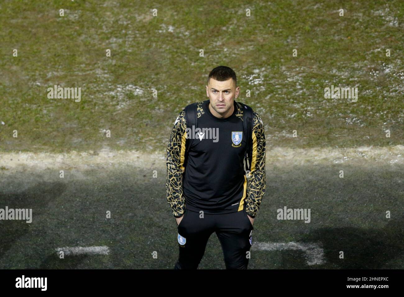 Jack Hunt #32 of Sheffield Wednesday pitch side as the players wait on ...