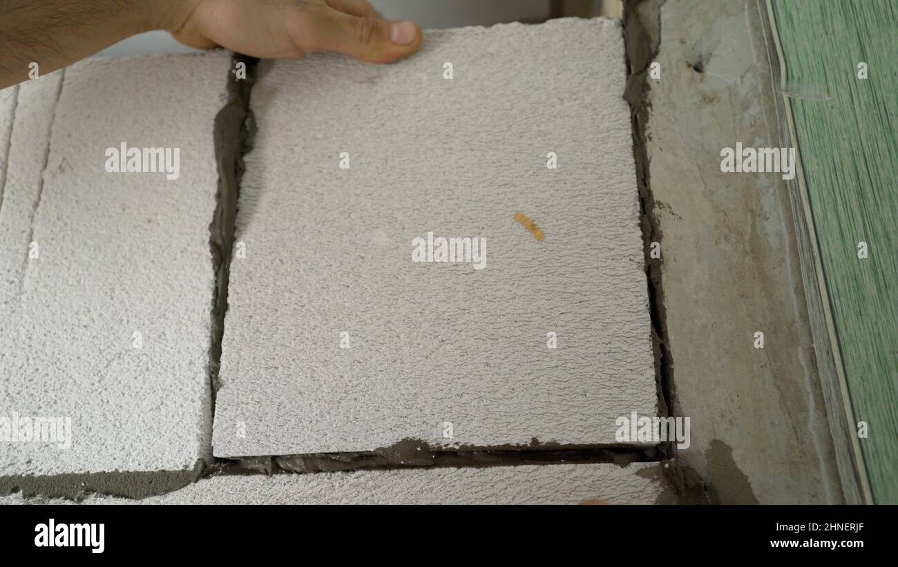 Construction of a wall from aerated blocks. A construction contractor ...