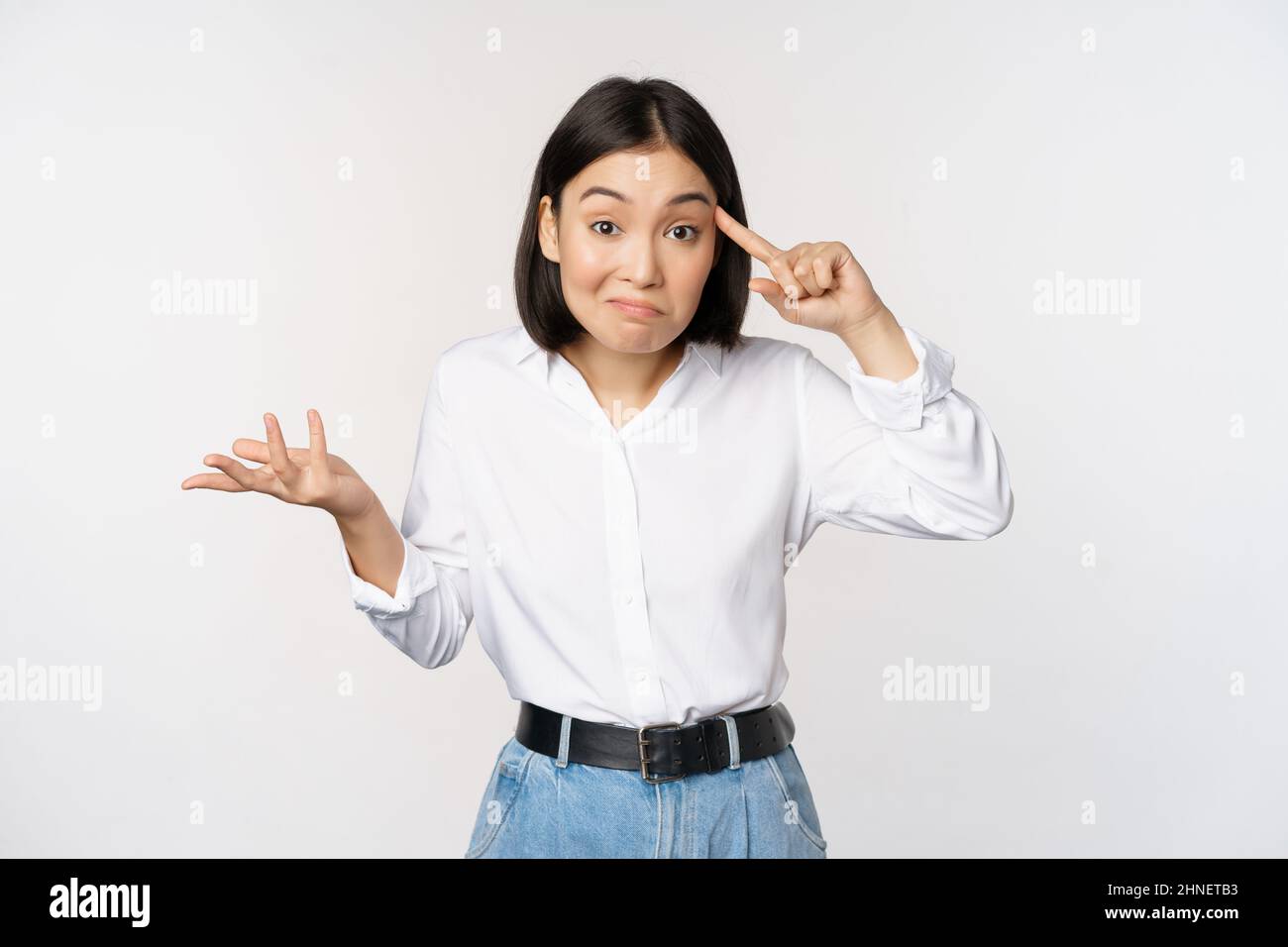 Are you insane. Portrait of frustrated young asian woman, roll finger ...