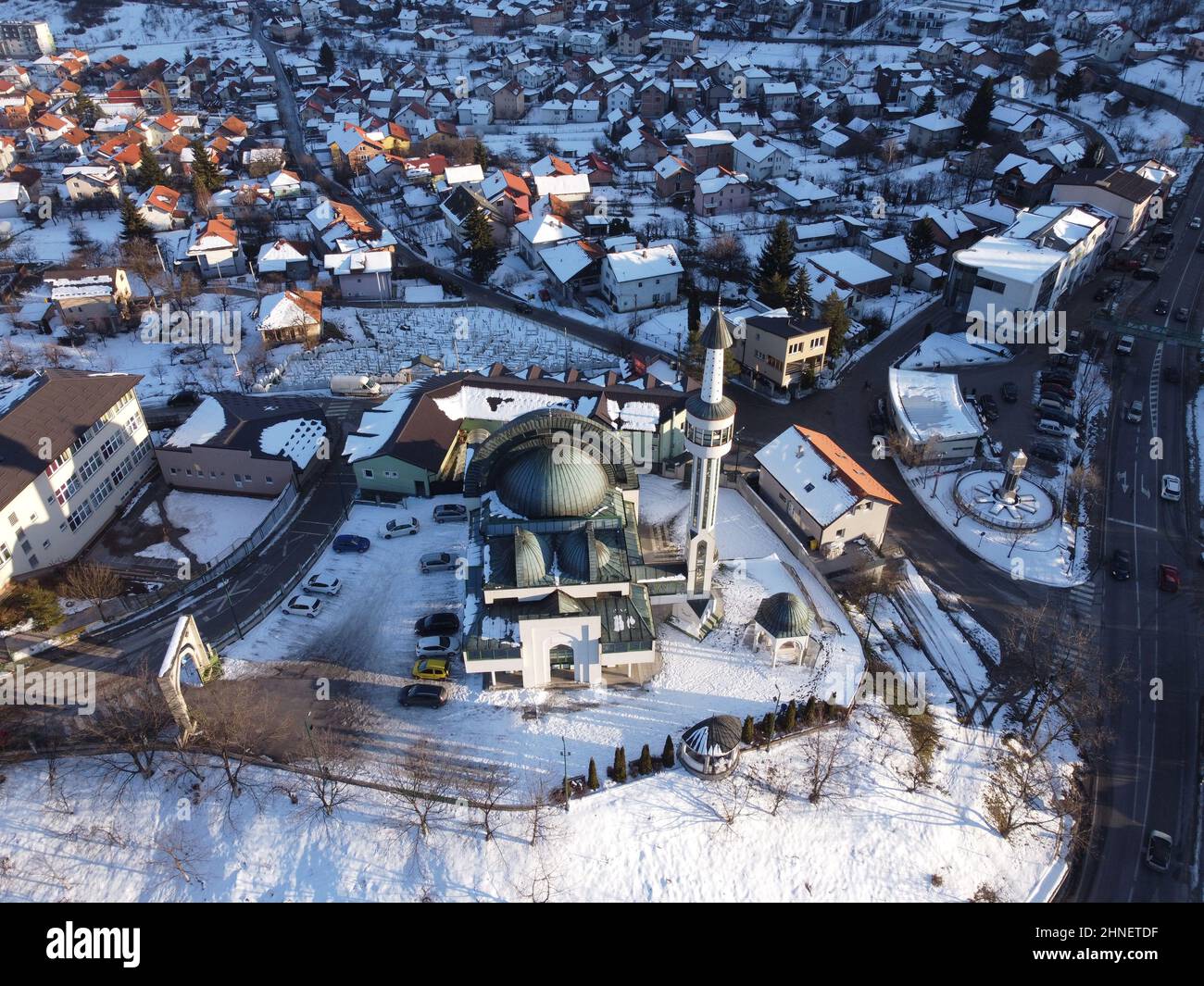 Aerial shot of the cityscape view of Sarajevo covered with the snow in ...