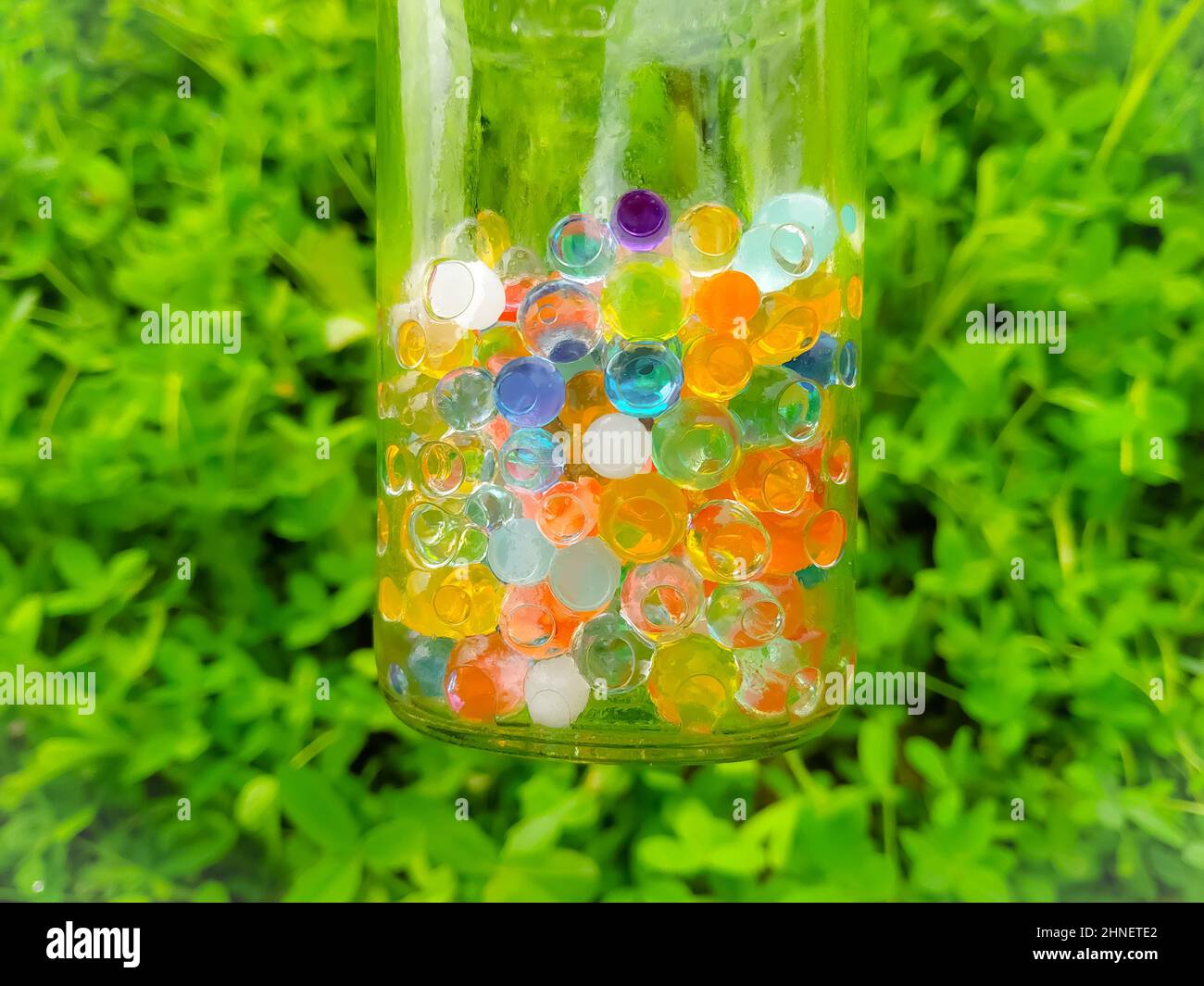 Selective focus shot of a glass of orbs hydrogel Stock Photo - Alamy
