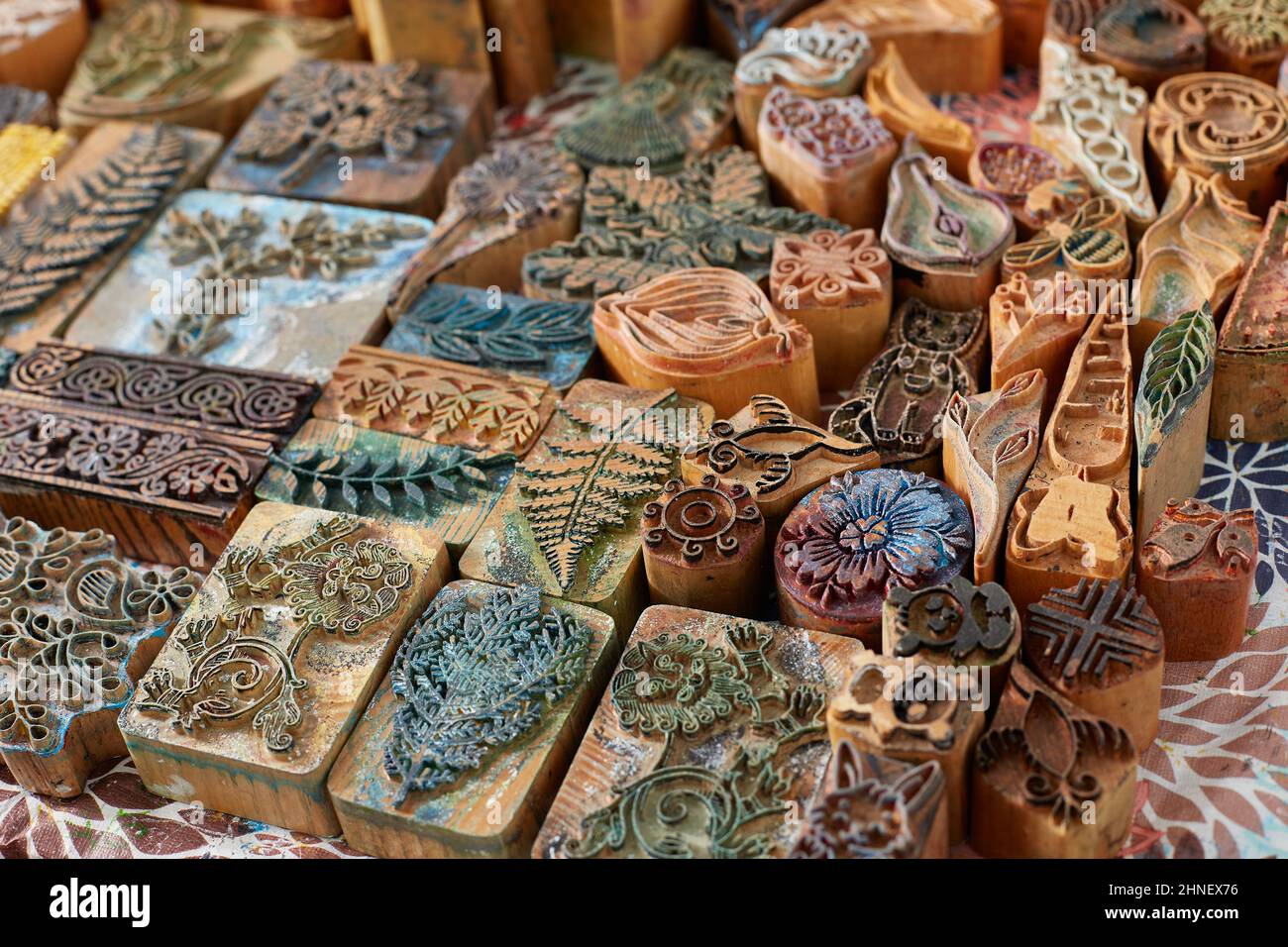 Wooden stamps for hand printing a pattern on fabric with paint. The ...