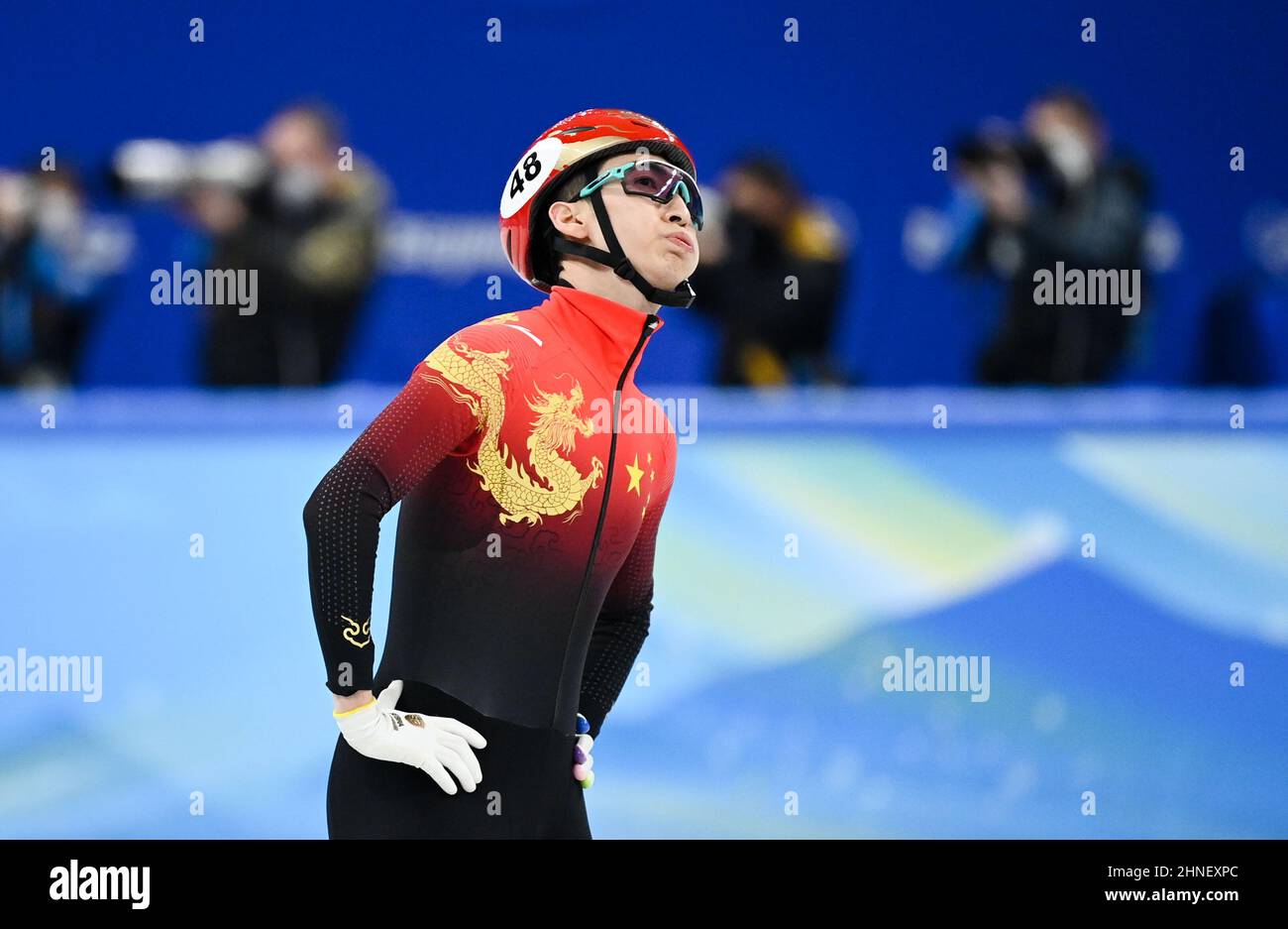 Beijing, China. 16th Feb, 2022. Wu Daijing of China reacts after the ...