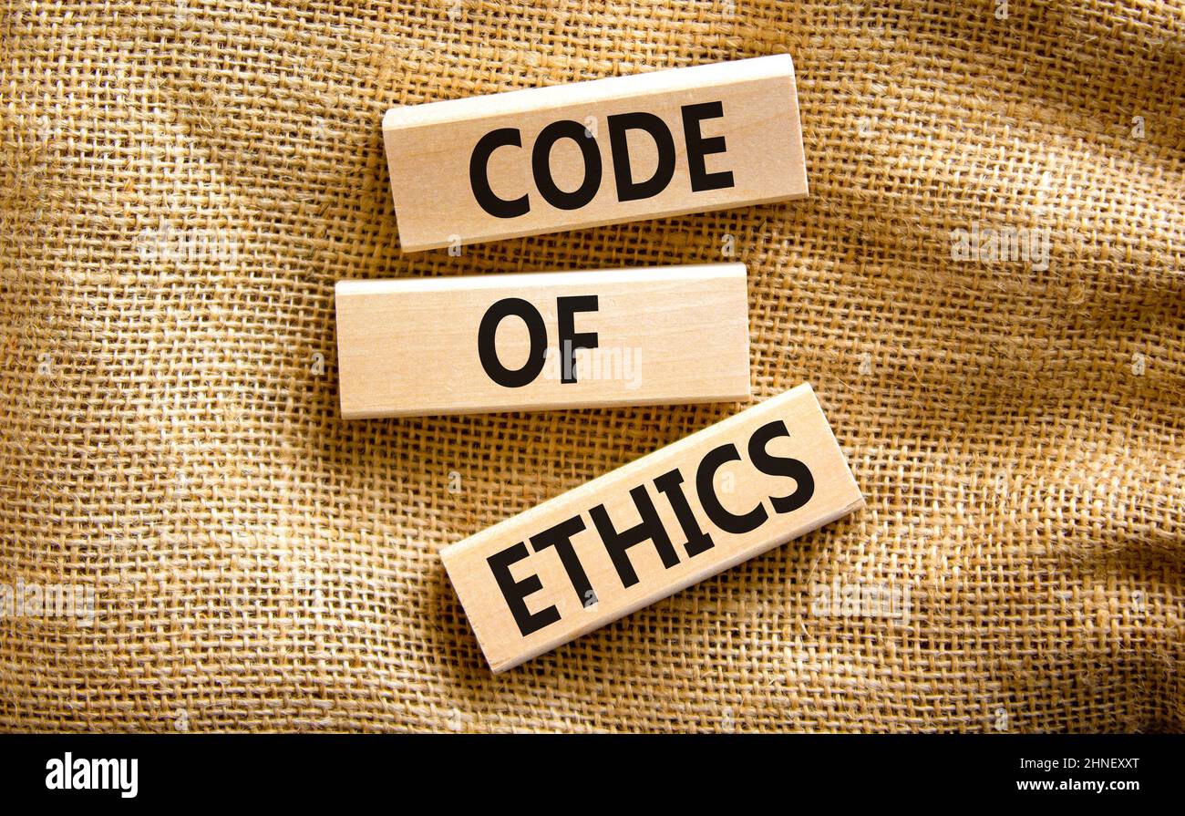 Code of ethics symbol. Concept words Code of ethics on wooden blocks on ...