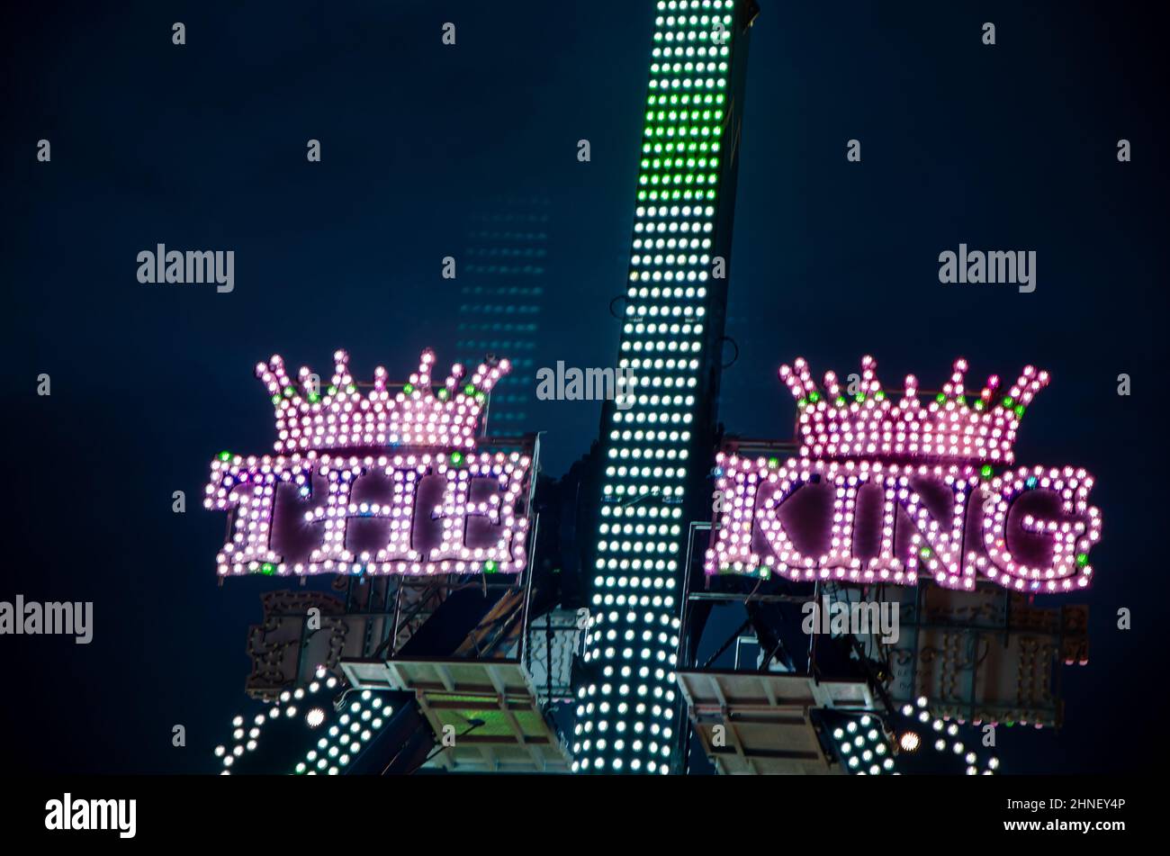 Colorful sparkle neon light in dark night Stock Photo - Alamy