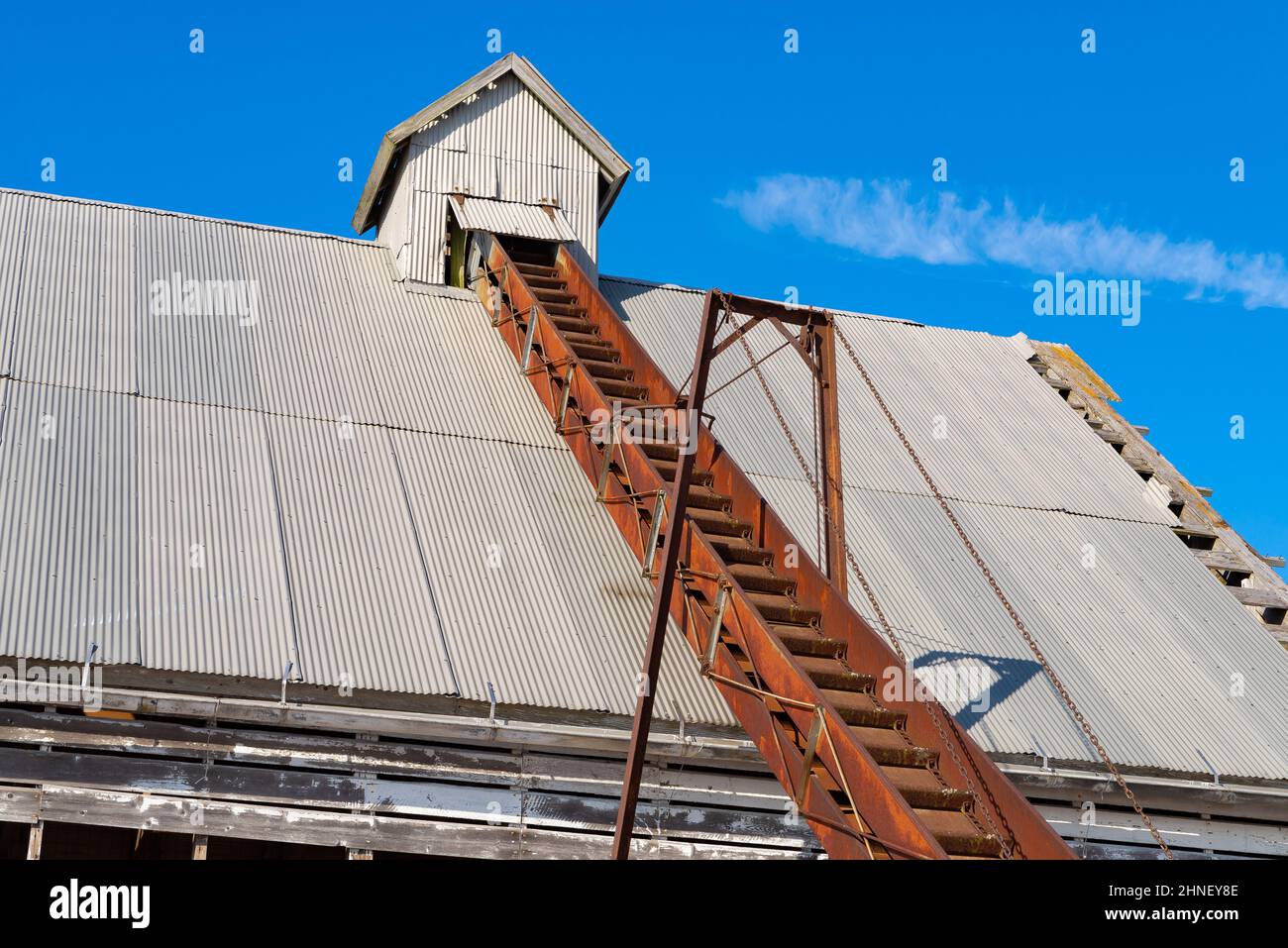 Rusted conveyor on old vintage barn in rural Illinois Stock Photo - Alamy