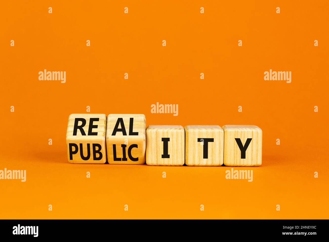 Reality or publicity symbol. Turned wooden cubes and changed the word ...