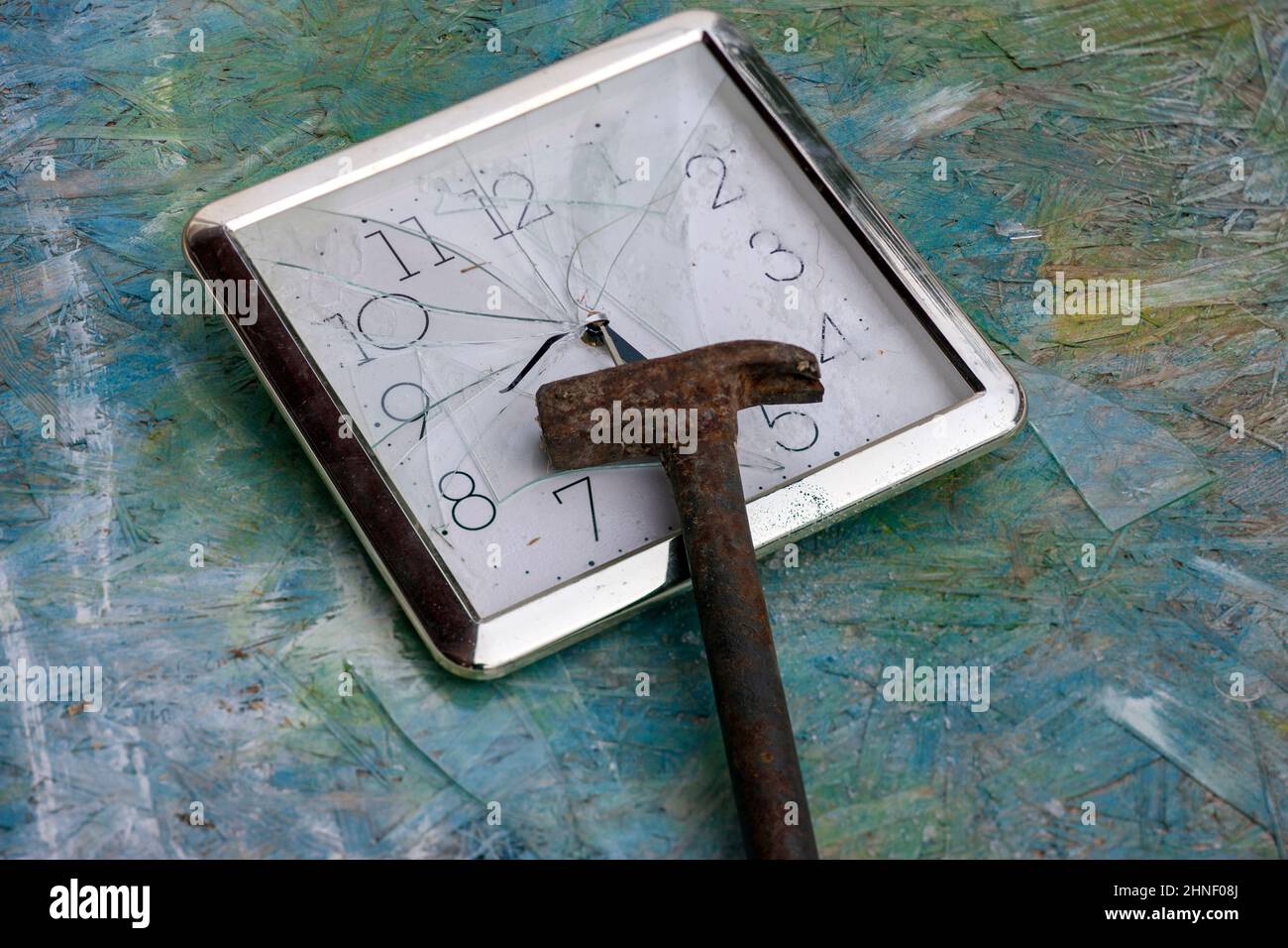 Smashed wall clock hi-res stock photography and images - Alamy