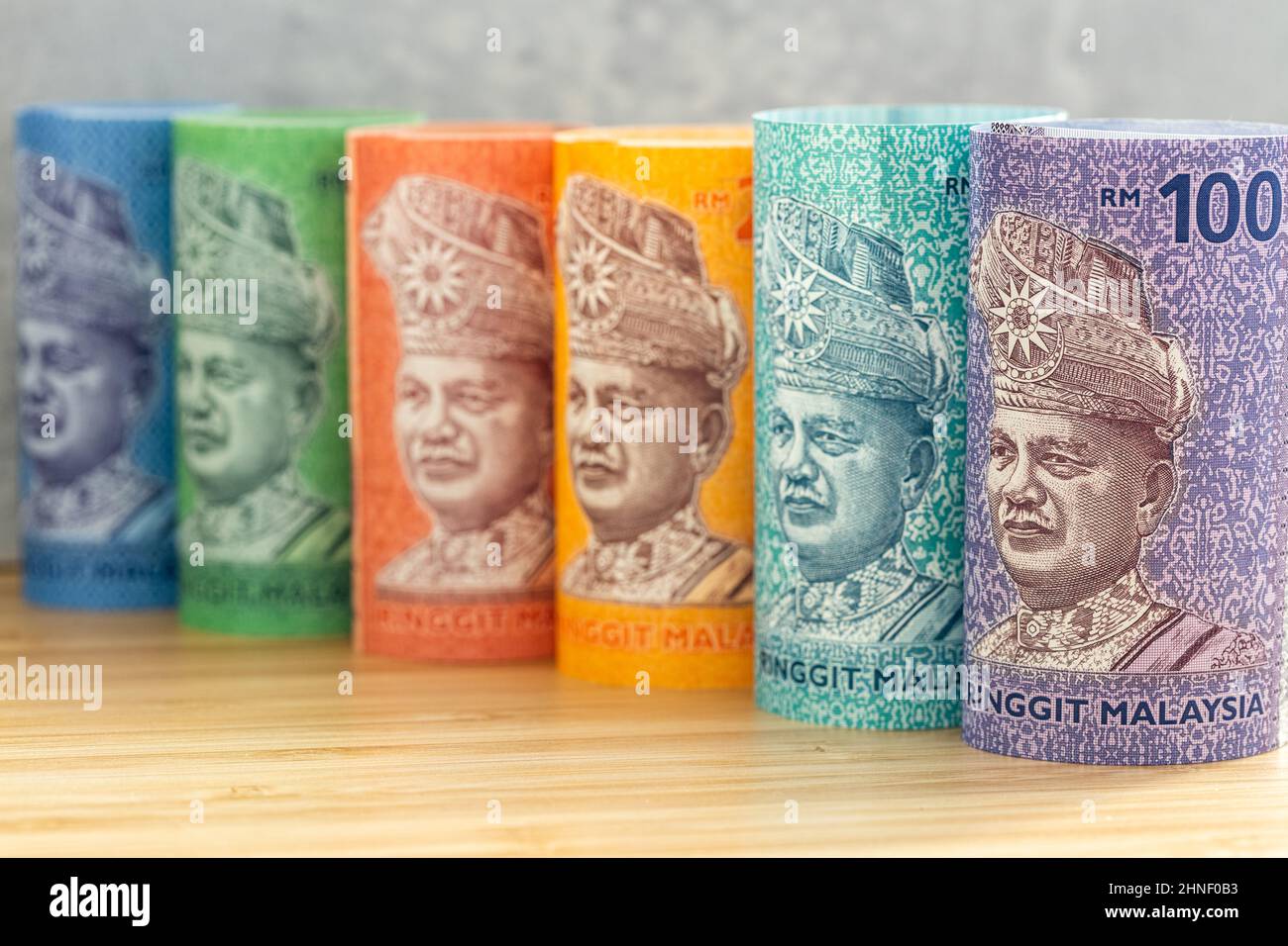 Malaysian Currency, Rolls of Money, Ringgit Notes lined up according to ...
