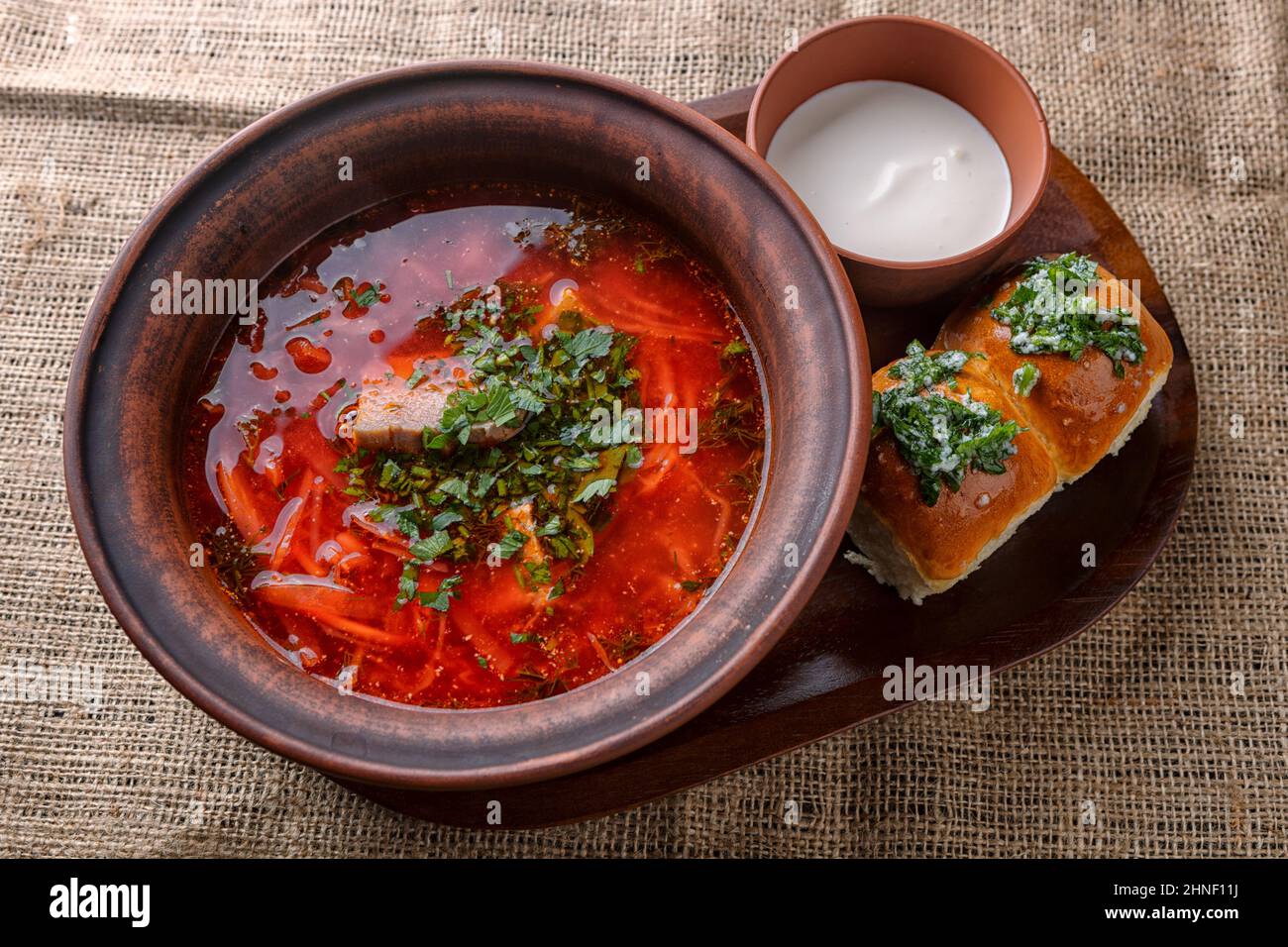 Ukrainian borscht with donuts with garlic and sour cream Stock Photo ...