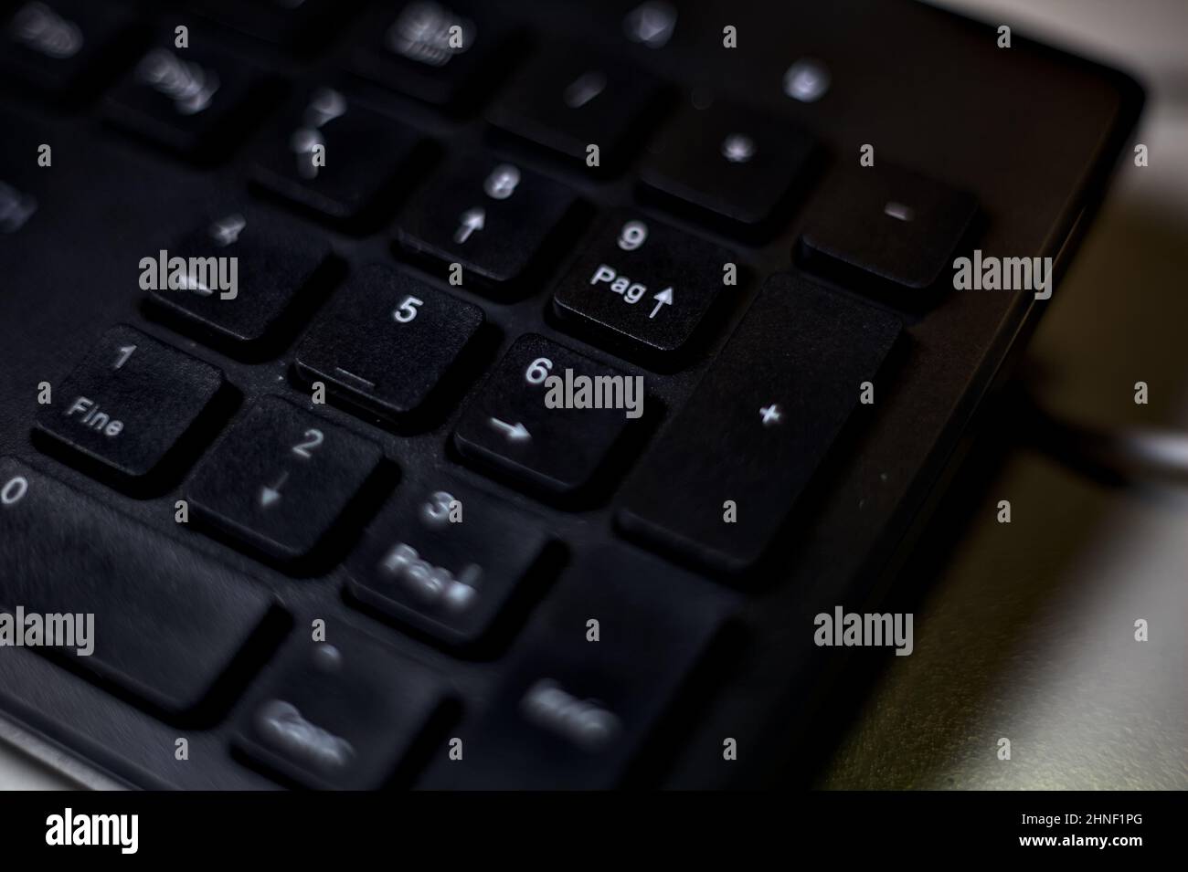 Computer keyboard on a desk seen up close Stock Photo - Alamy