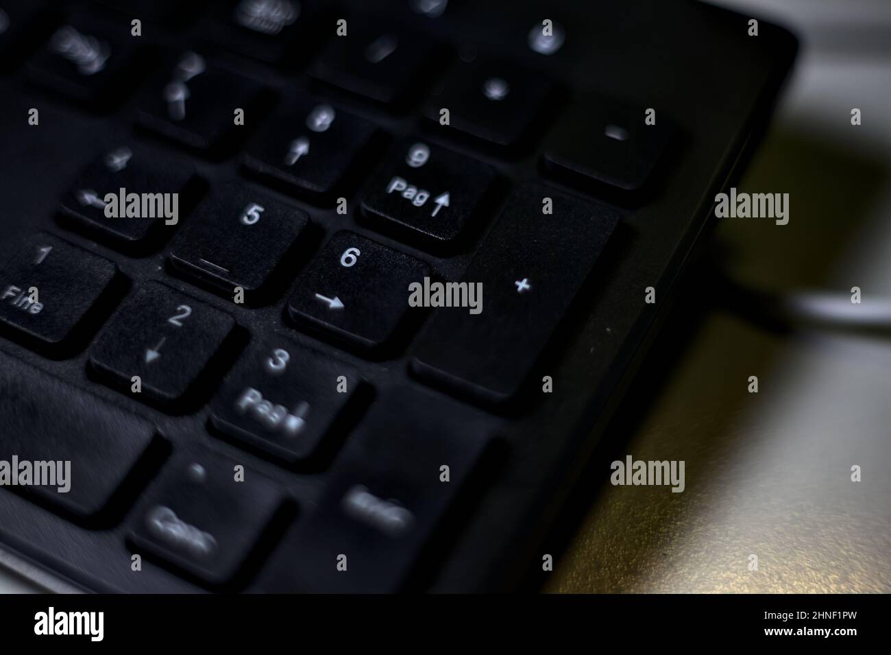 Computer keyboard on a desk seen up close Stock Photo - Alamy