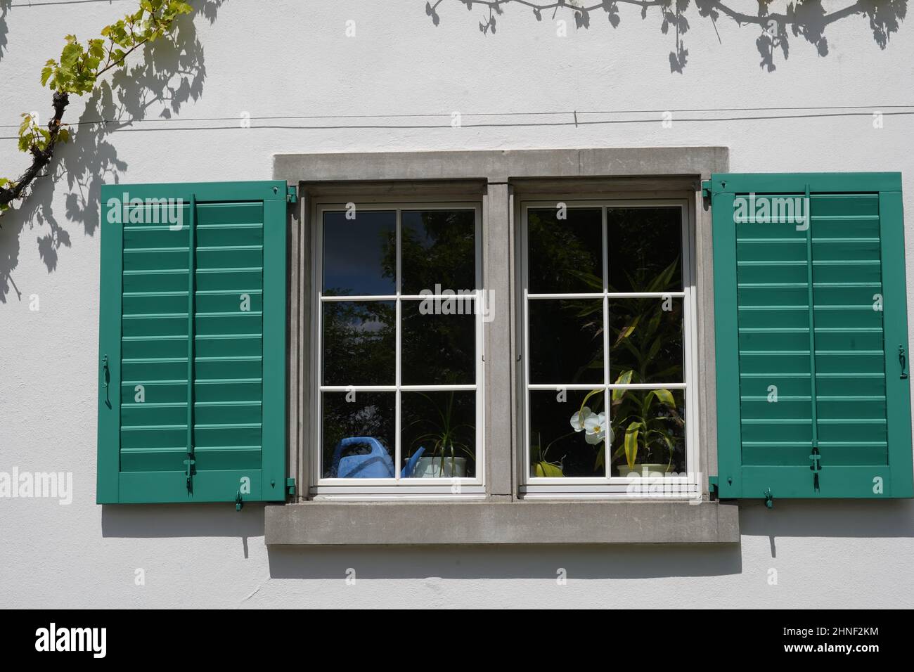 Window with green shutters Stock Photo - Alamy