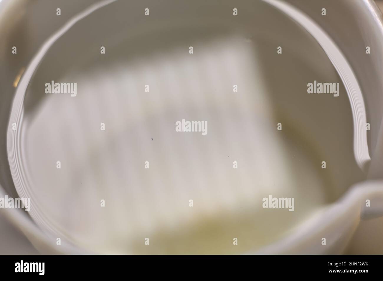 Plastic pitcher filled with water seen up close Stock Photo - Alamy