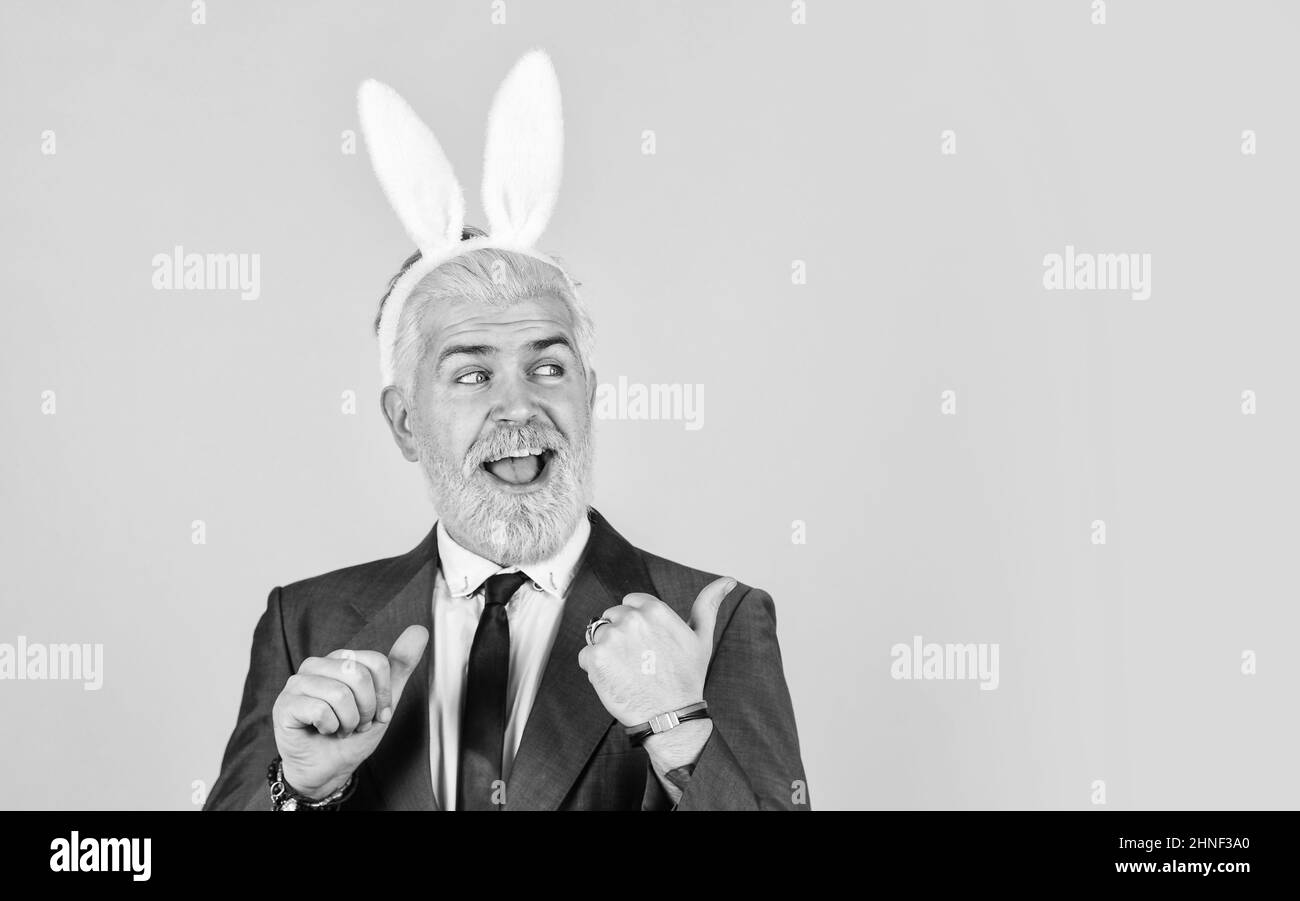 Funny boss. Easter activities for office. Bearded man bunny ears on ...