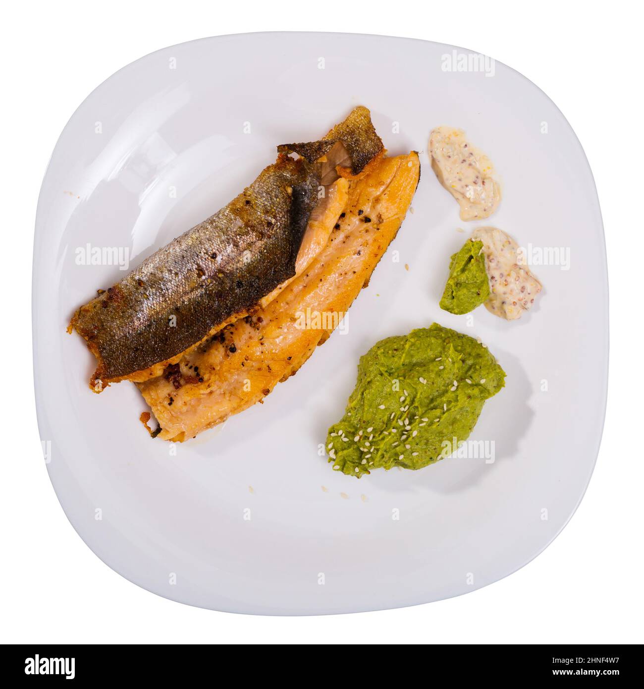 Top view of fried trout fillets with broccoli puree Stock Photo - Alamy