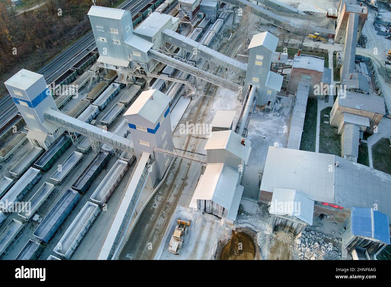 Aerial view of cargo train loaded with crushed sandstone materials at ...