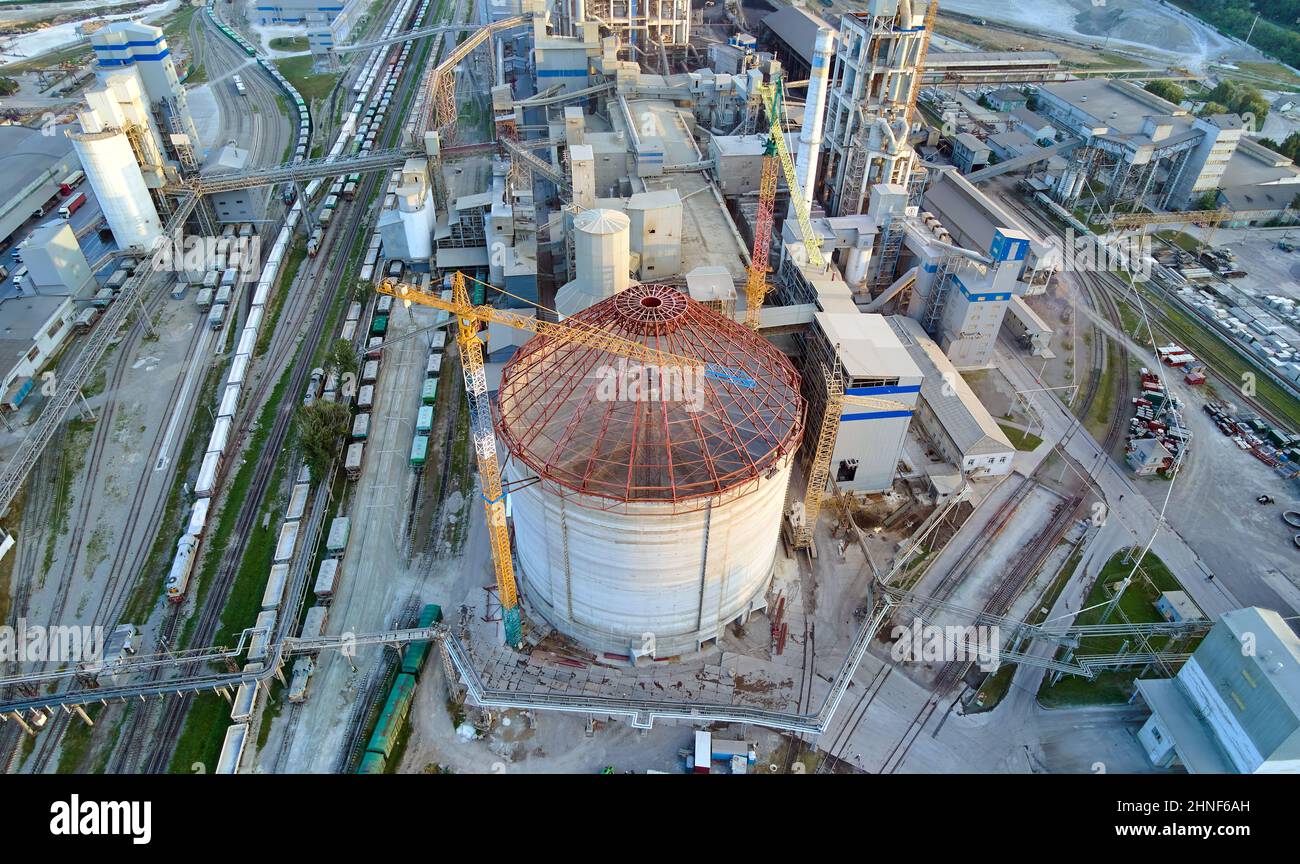 Aerial view of cement factory under construction with high concrete ...