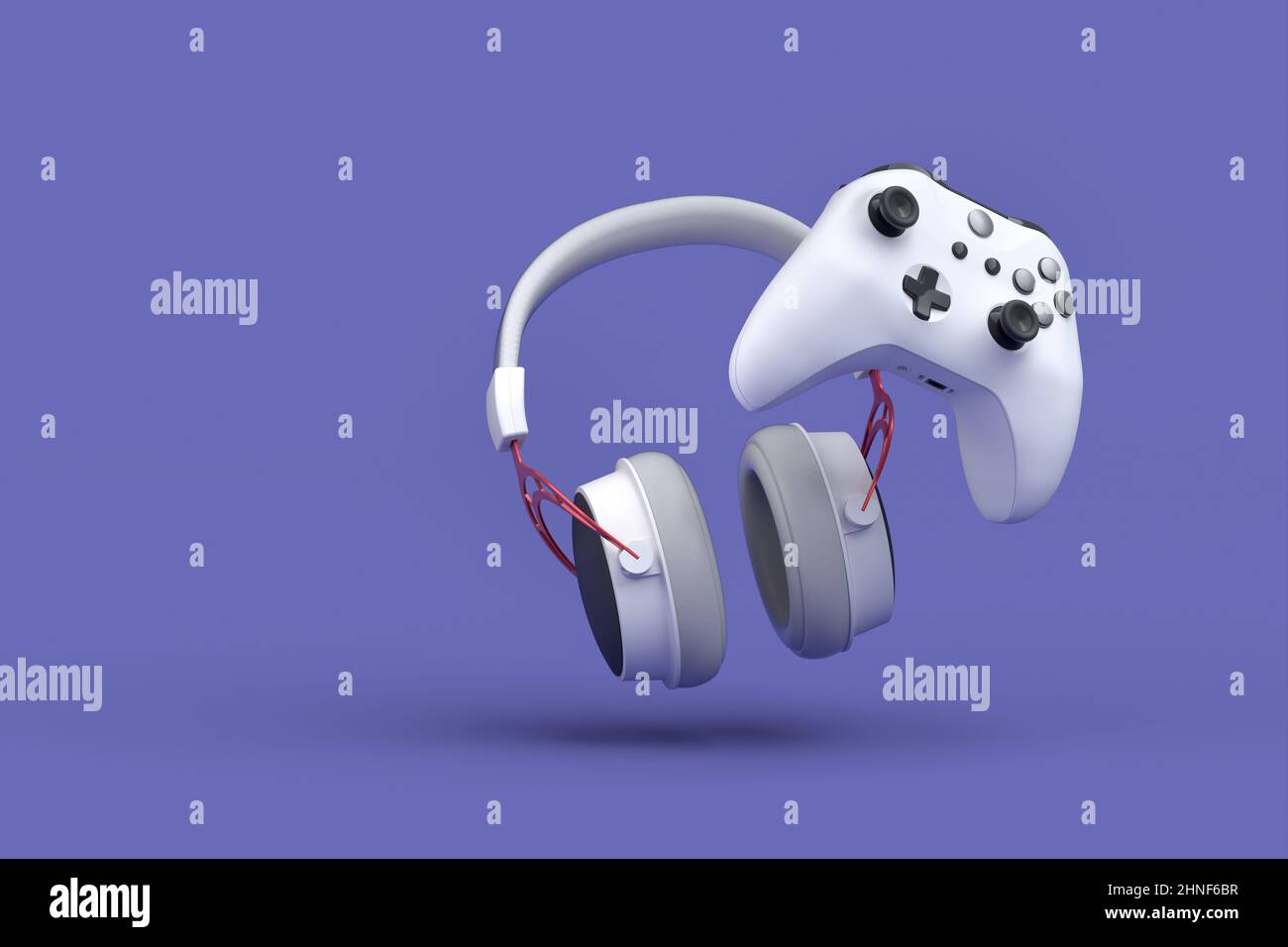 Flying gamer gears like headset, headphones and joystick on purple ...