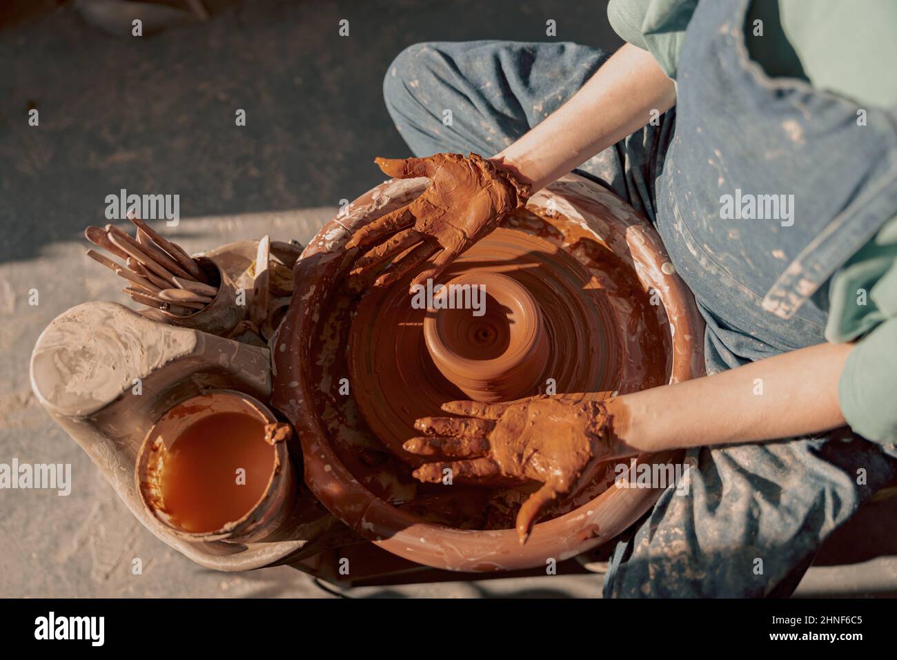 Artist sculpting clay product in hi-res stock photography and images ...